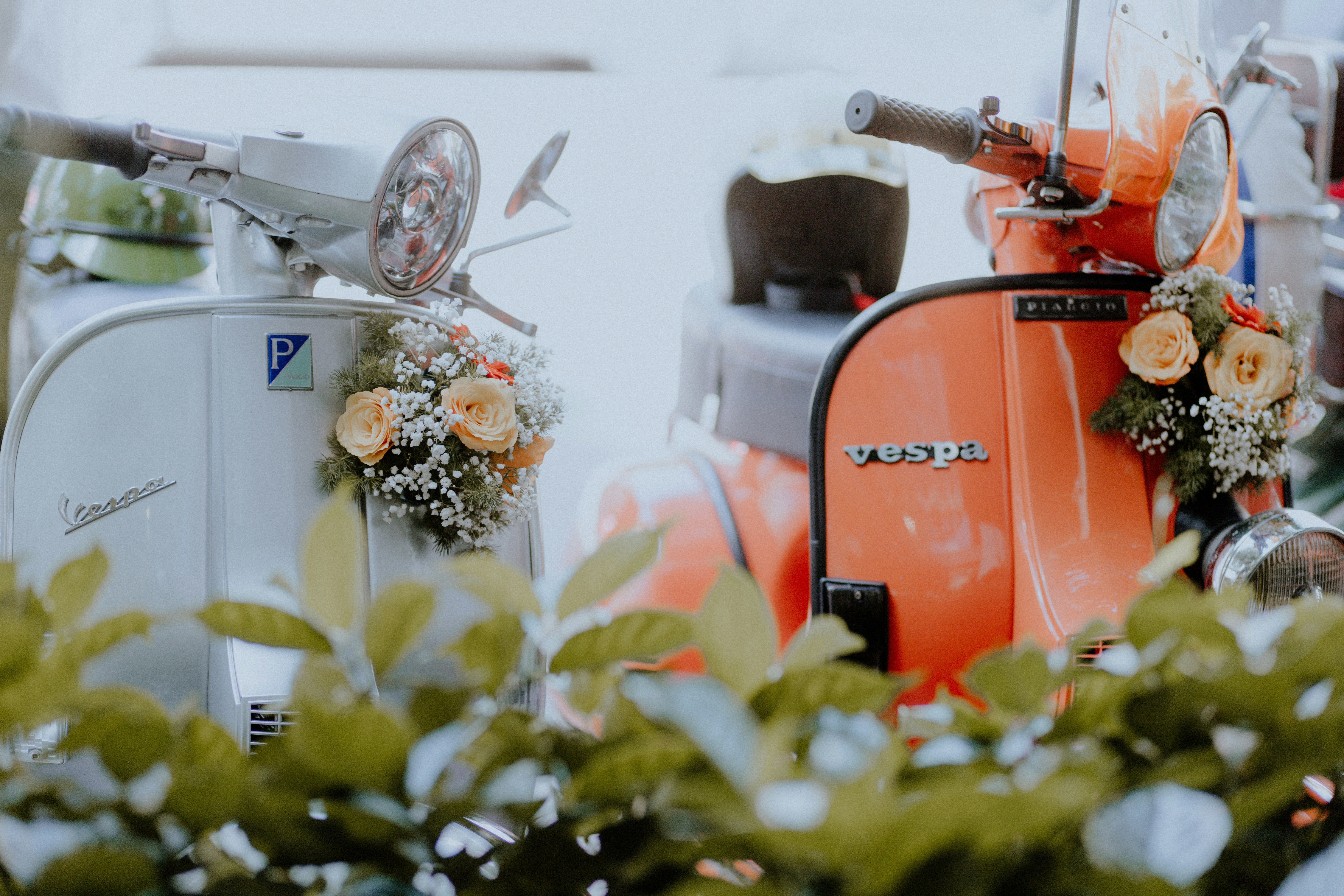 Floral Accents Meet Vintage Scooters: A Sunny Duo