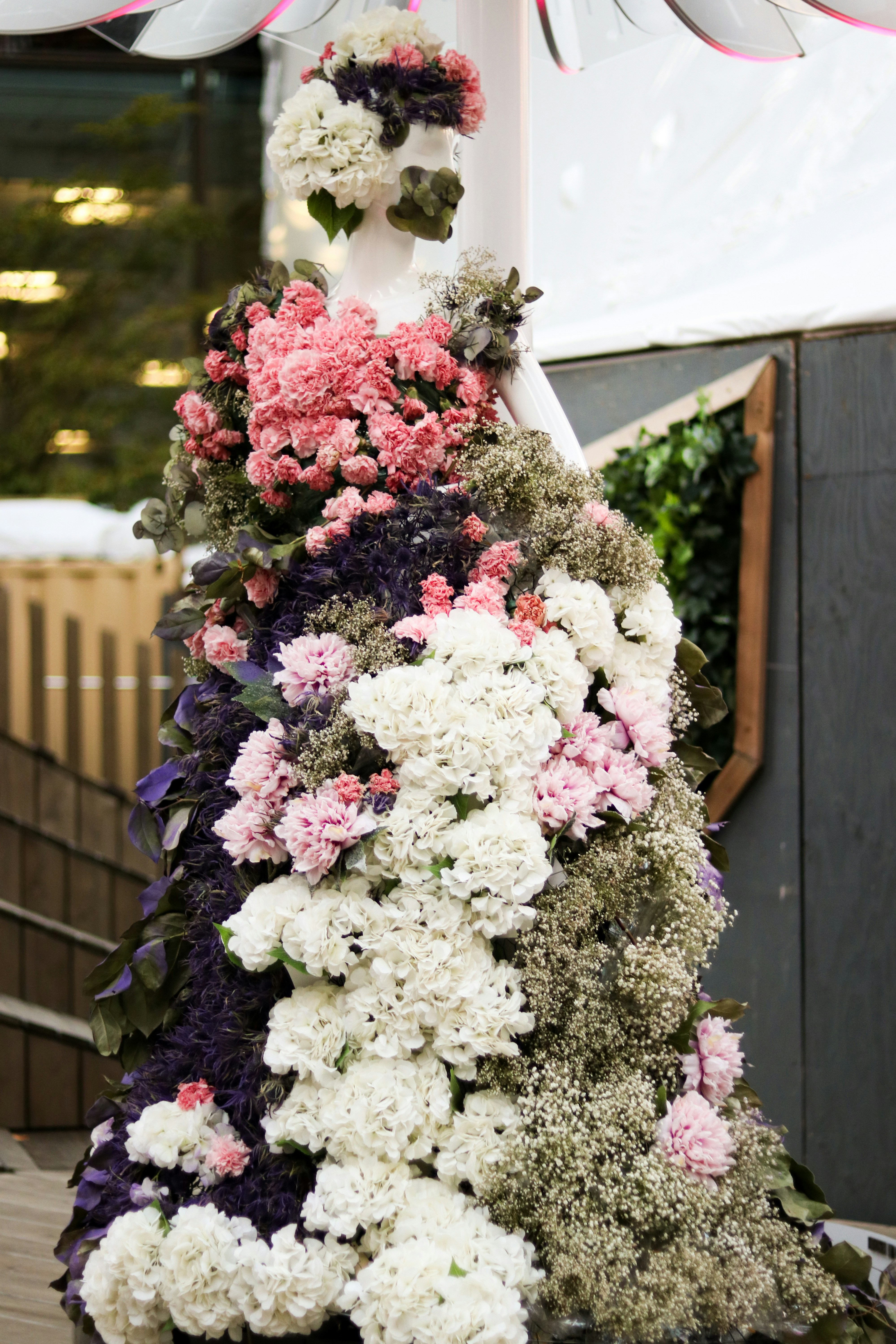 Bouquet Guardian: A Floral Gown of White, Pink, and Pale Green