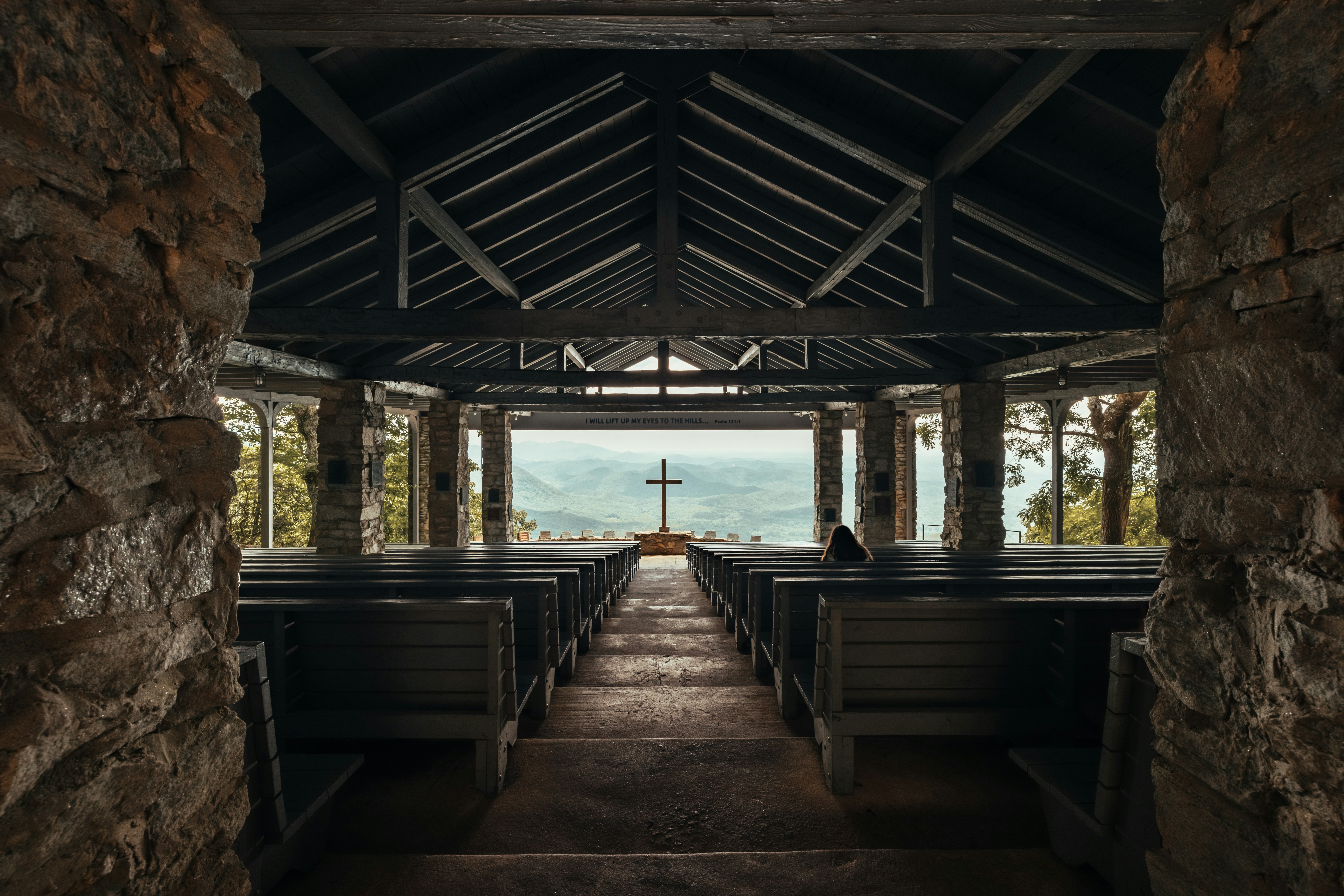 An empty church with benches and a cross photo – Free Fred w. symmes ...