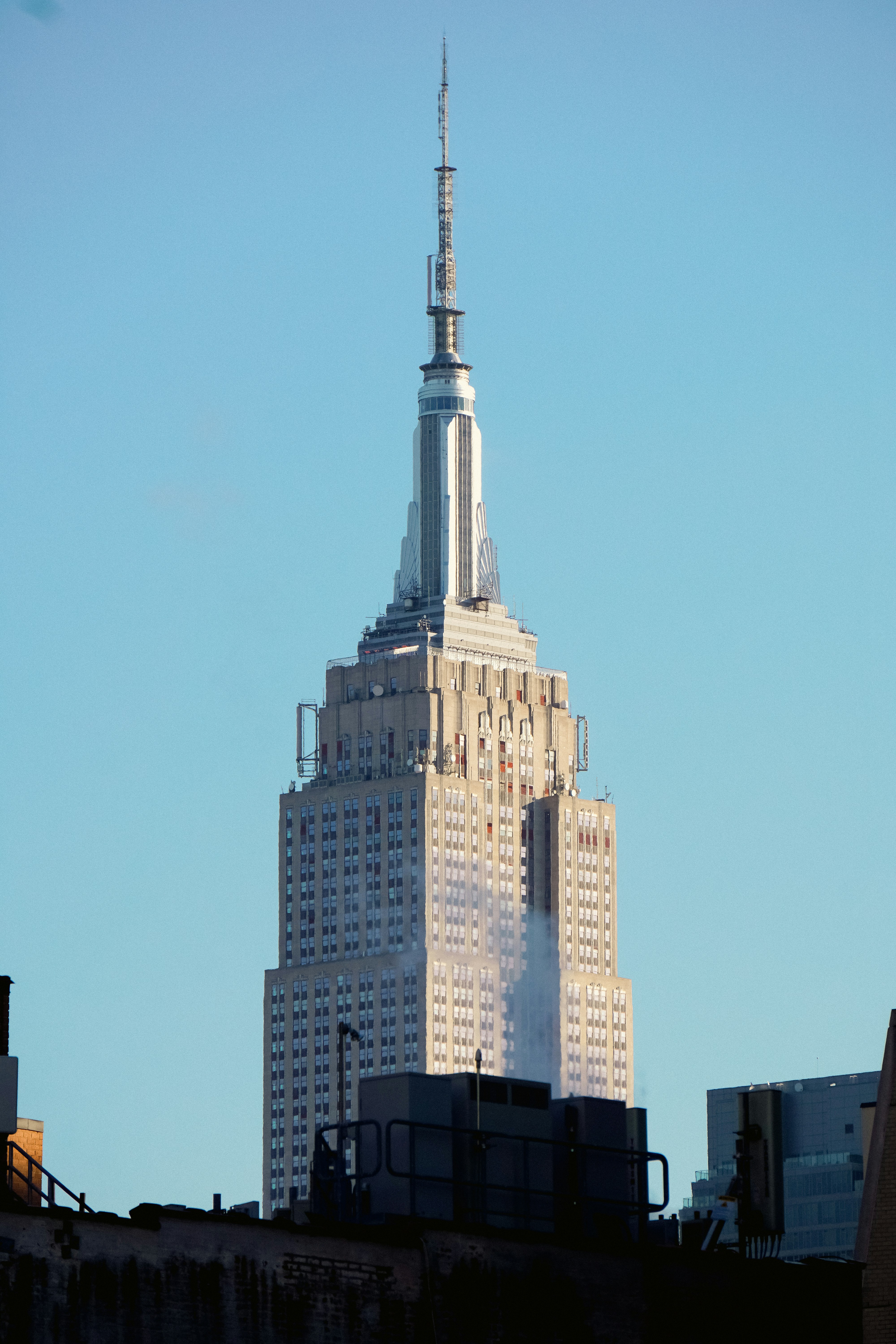 A very tall building with a very tall spire photo – Free Building Image ...