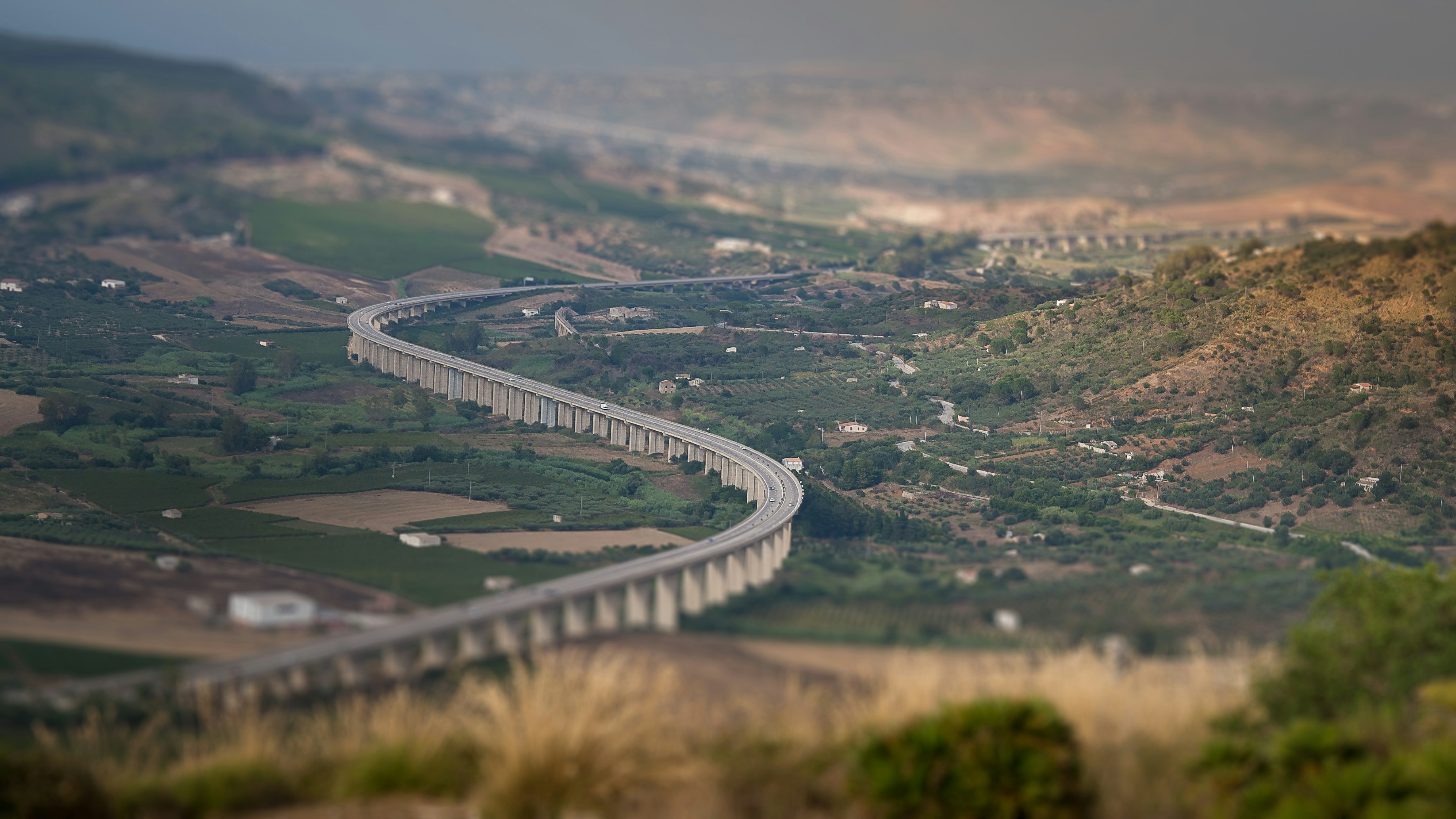 A view of a highway going through a valley photo – Free Road Image on ...