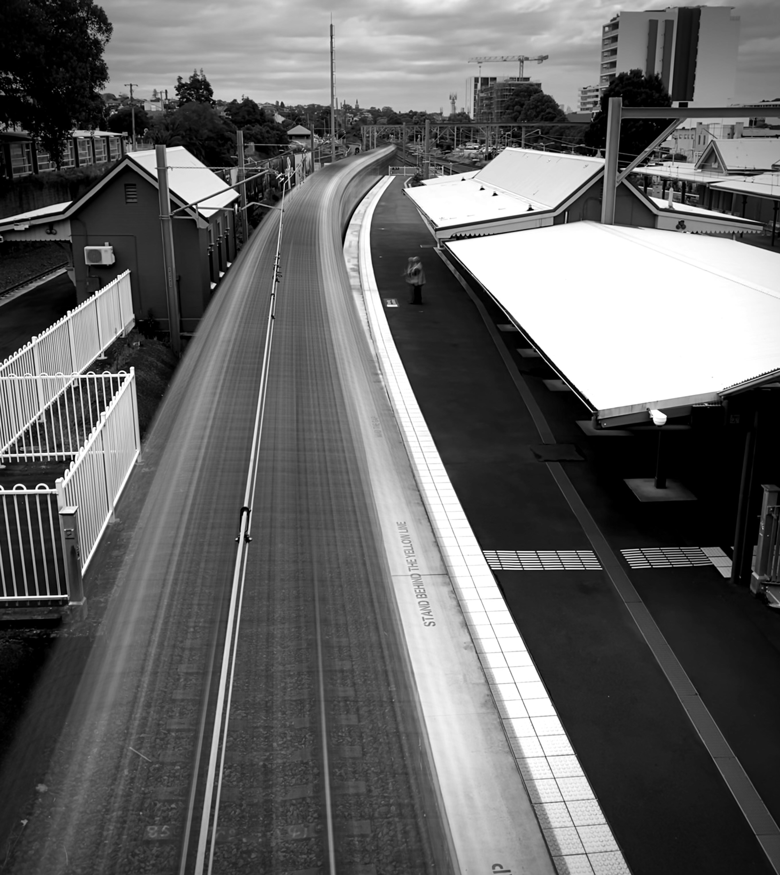 Convergence on a Monochrome Platform: Rails Toward the City