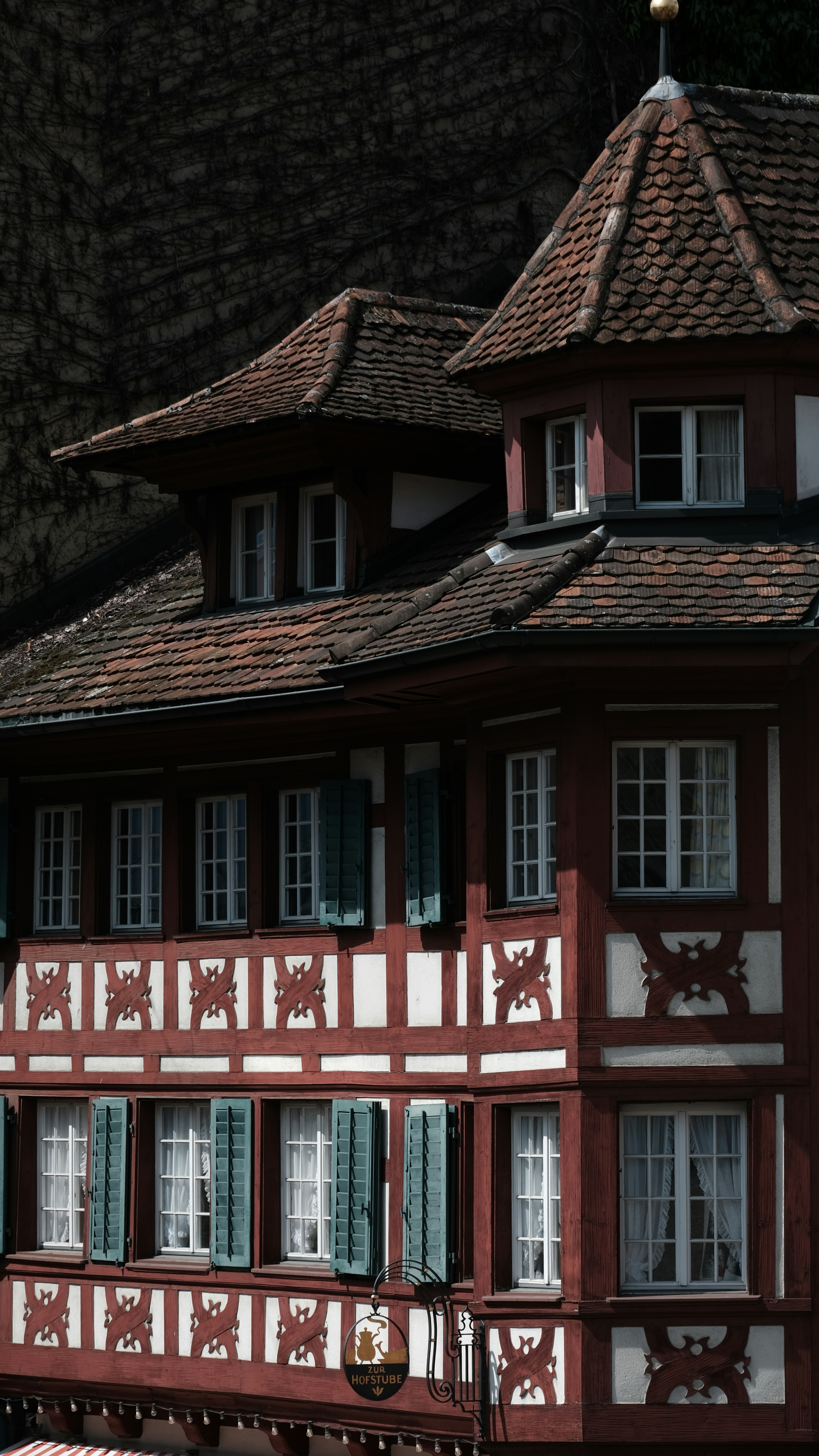 Red Timbered Facade with Turreted Roofs
