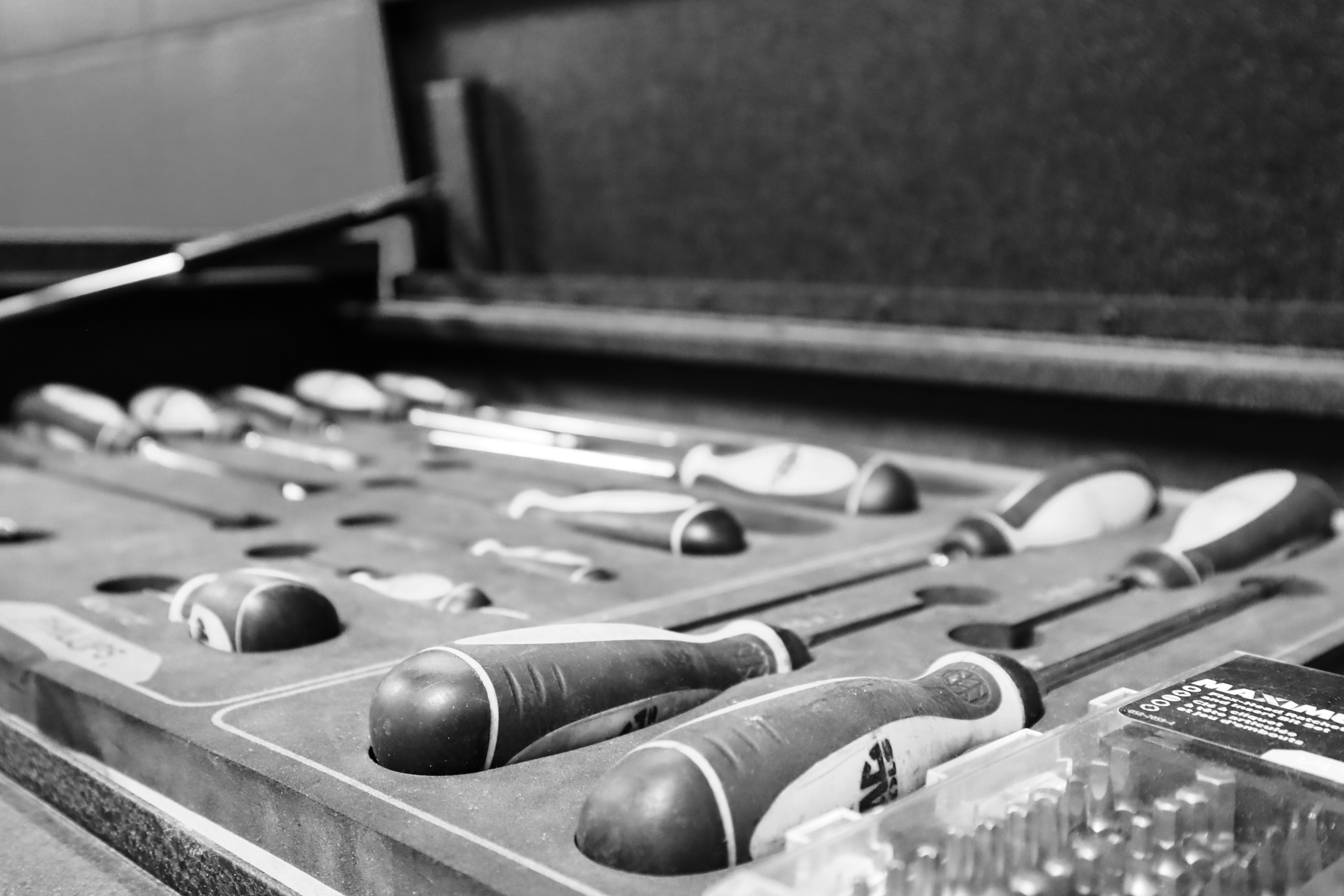 Monochrome Foosball Close-Up: Handles in Sharp Focus