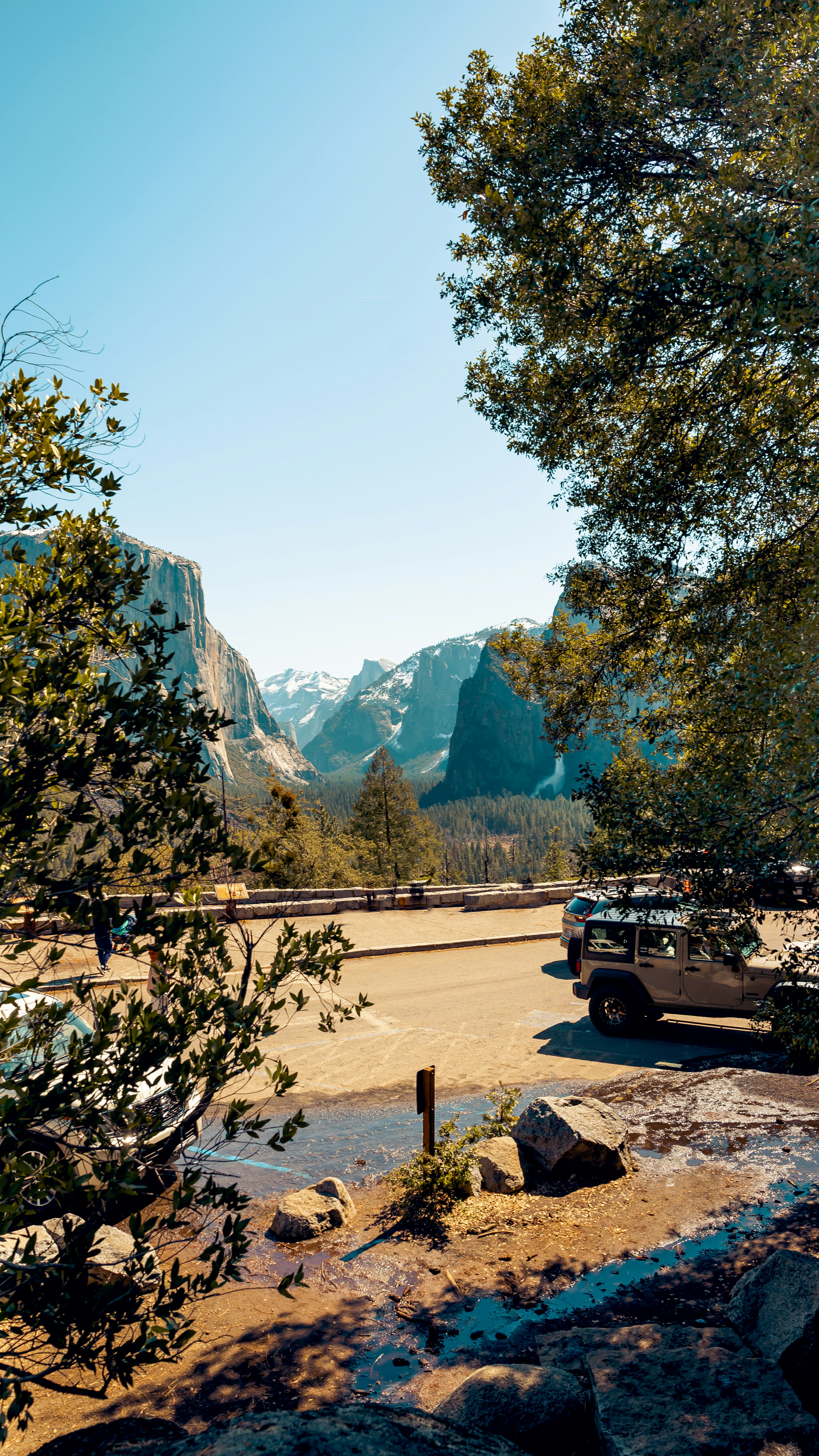 Alpine Overlook: A Rugged SUV Pauses Beneath Sierra Peaks