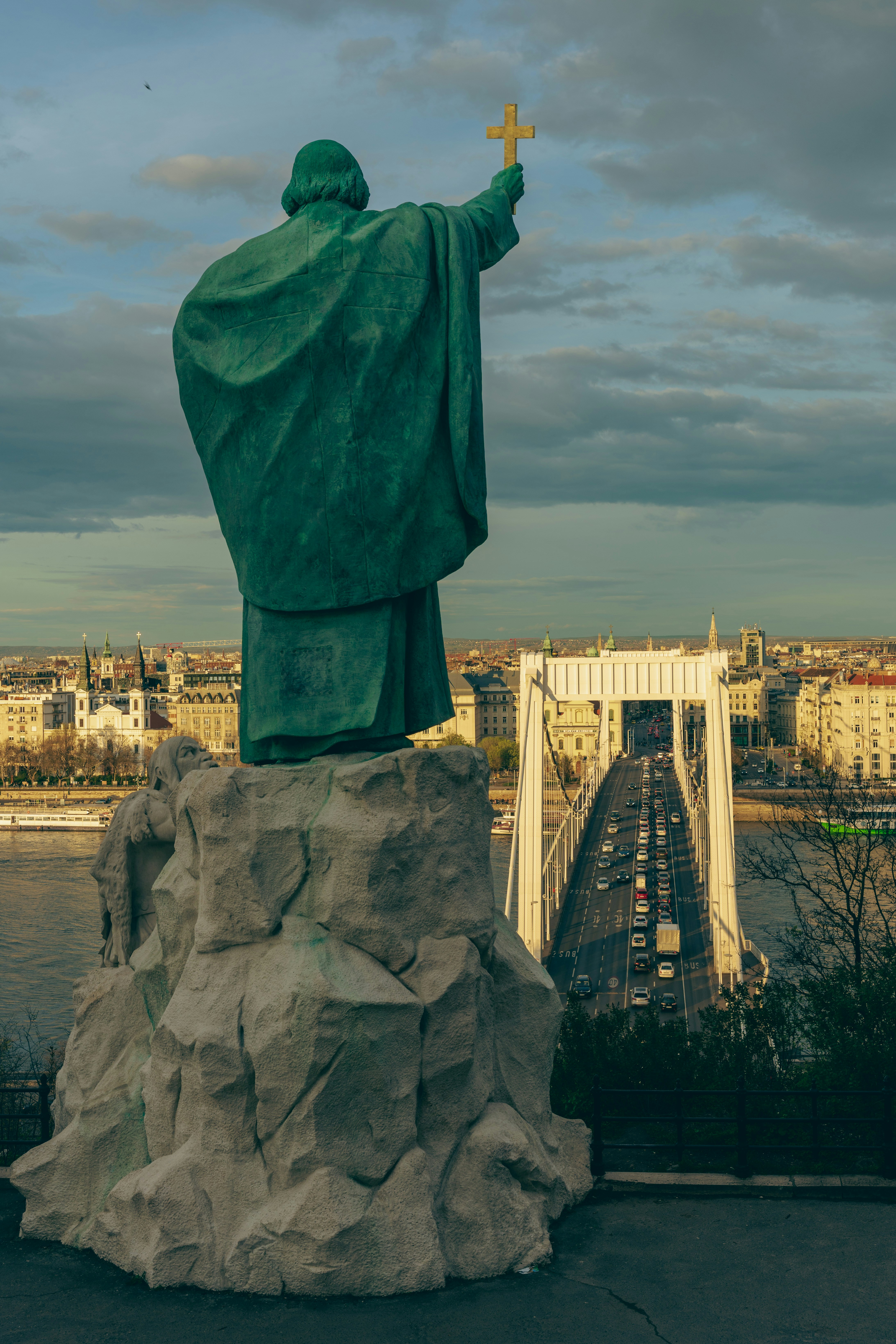 Verdigris Guardian Over the Danube: The Statue at the Gate of Chain Bridge