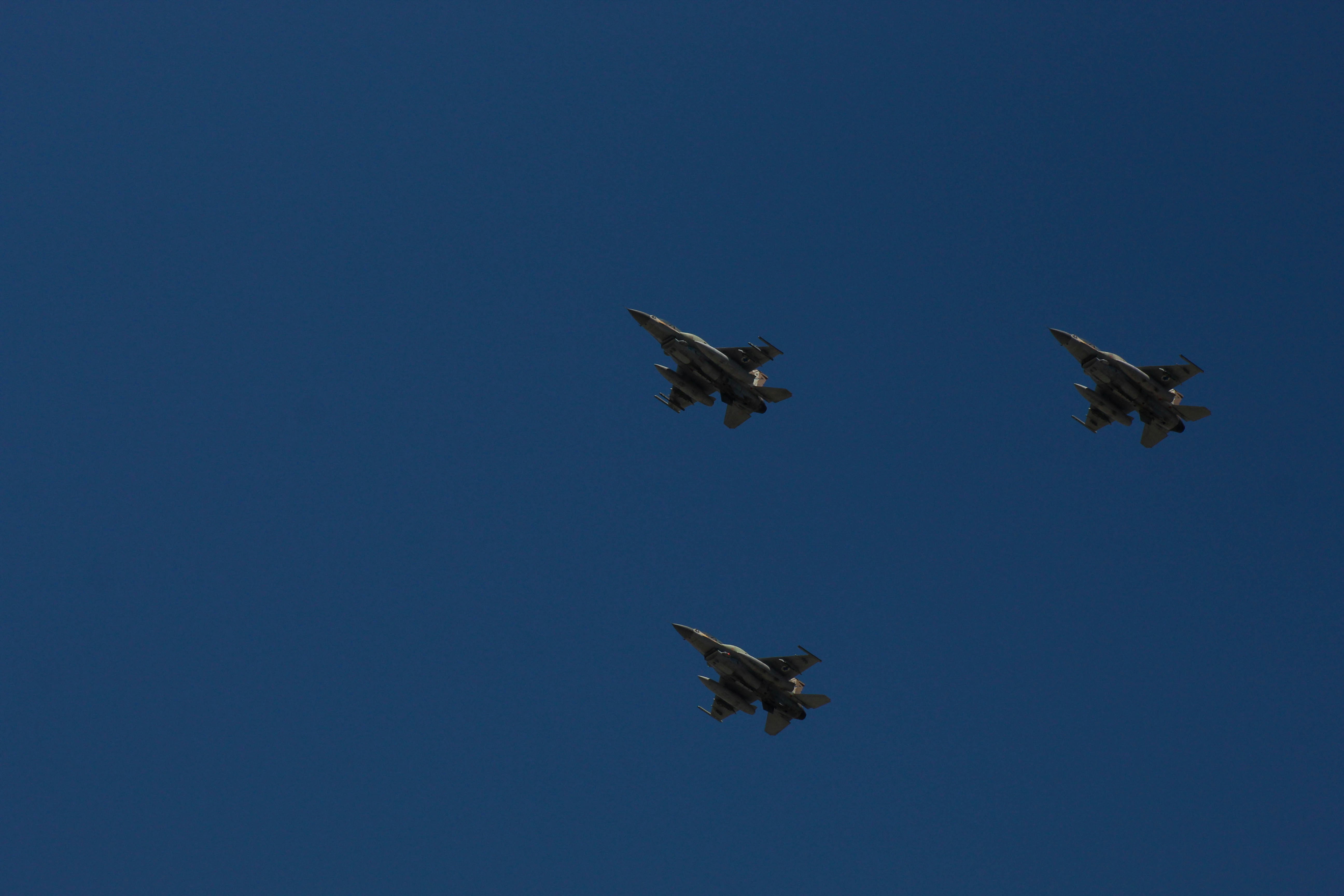 A group of four jets flying through a blue sky photo – Free Air force ...