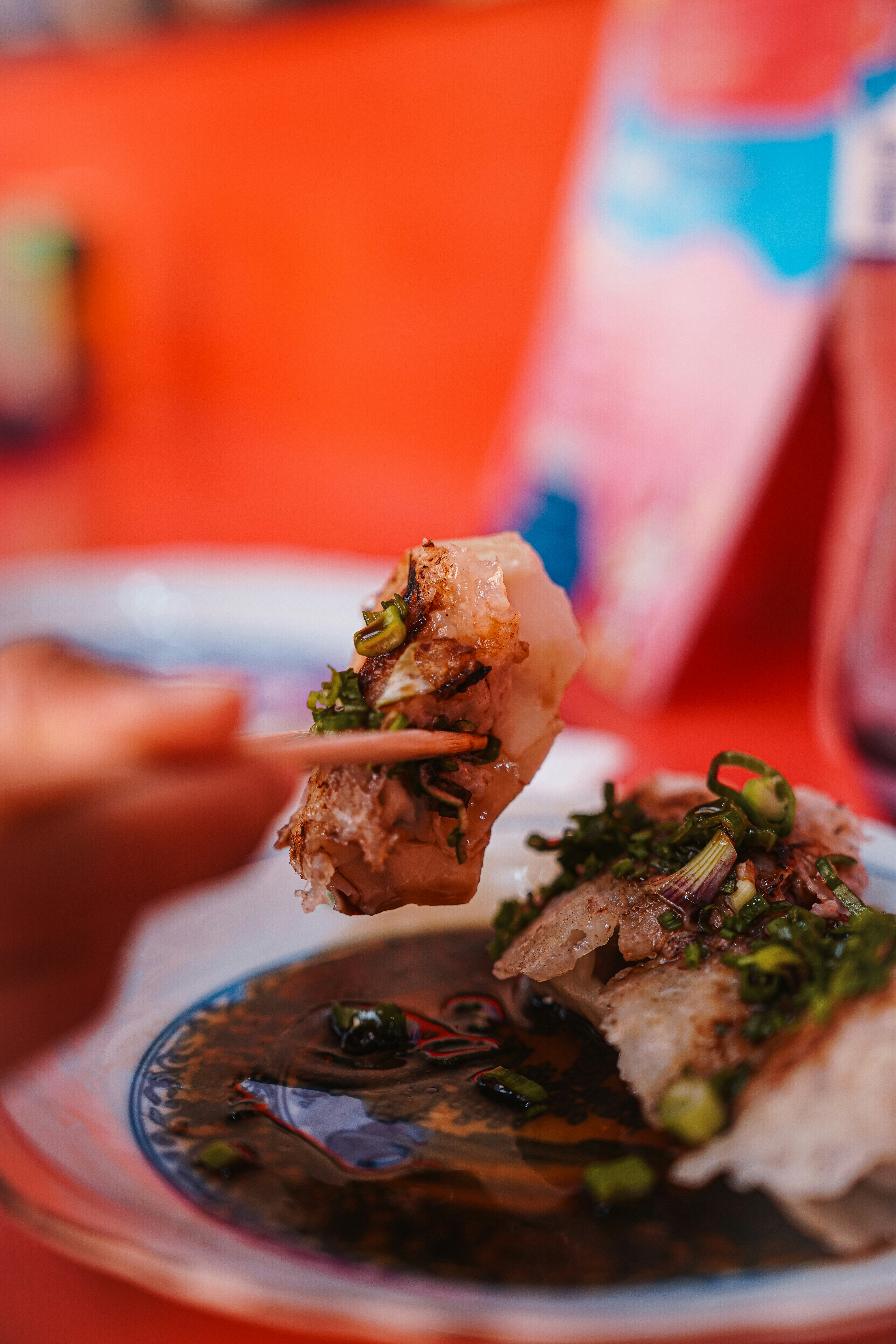 A plate of food with chopsticks sticking out of it photo – Free Food ...