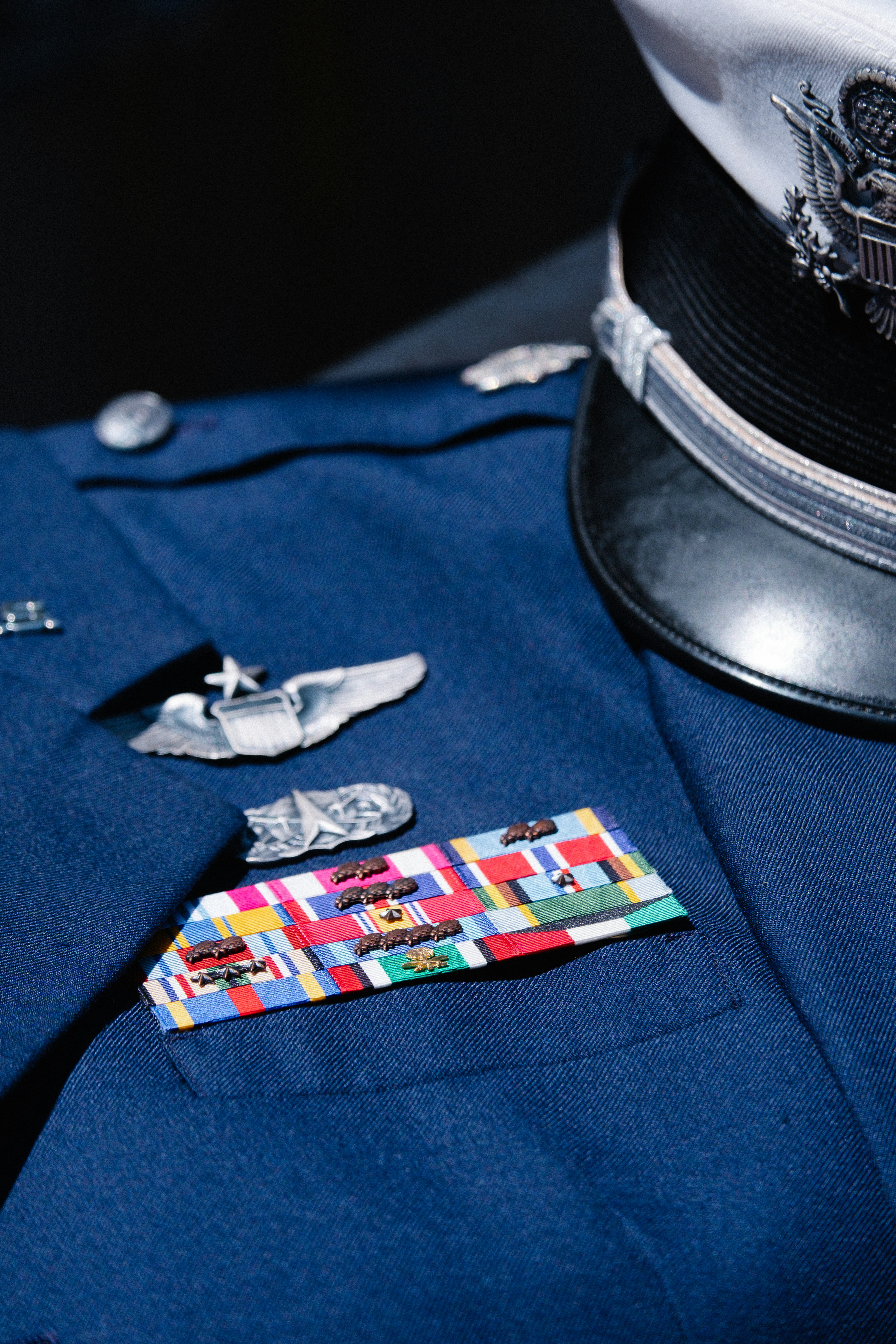 Salute in Blue: Medal Ribbons and Dress Uniform Close-Up