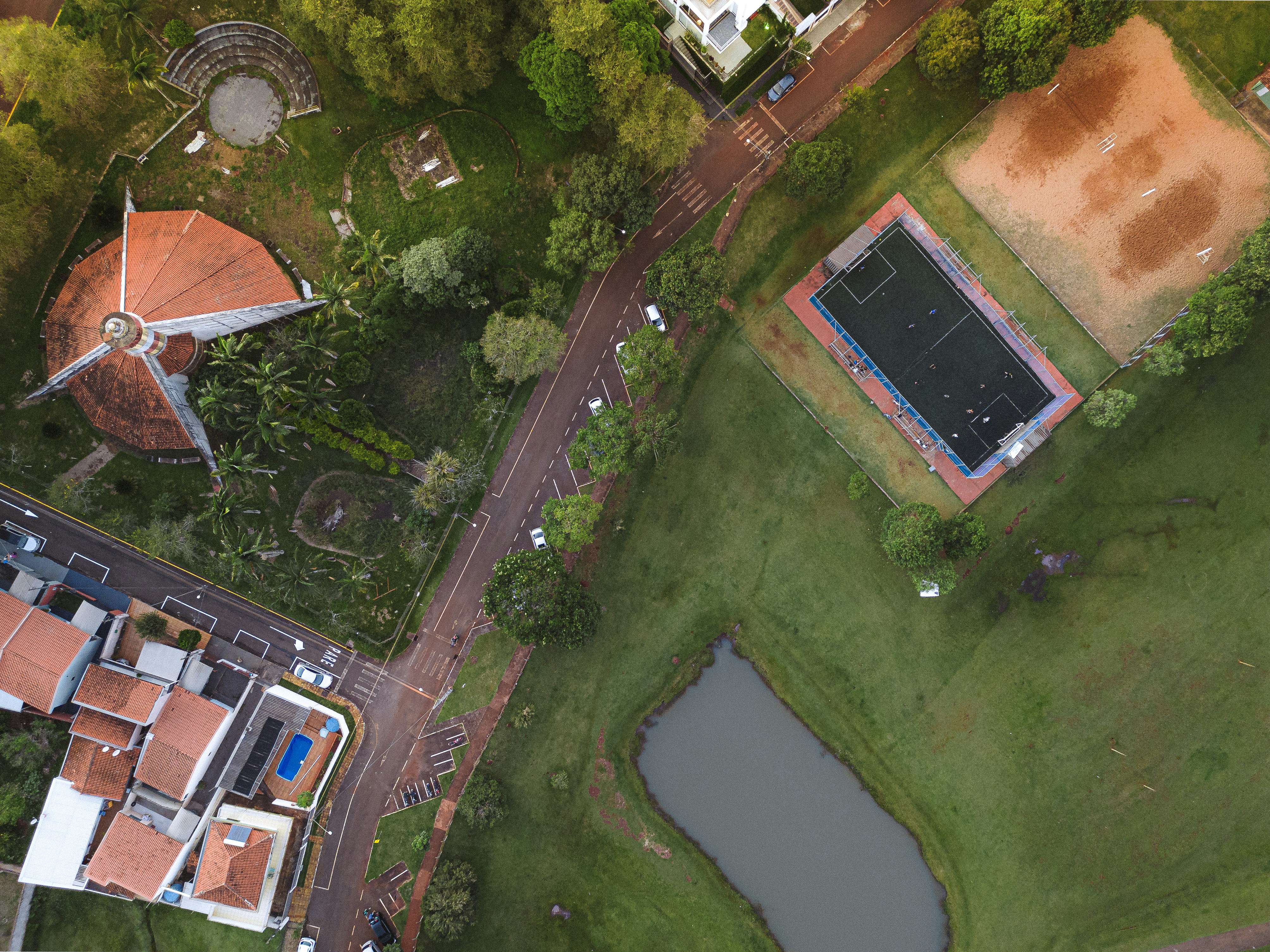 Red-Roofed Rotunda Framed by Suburban Streets from Above