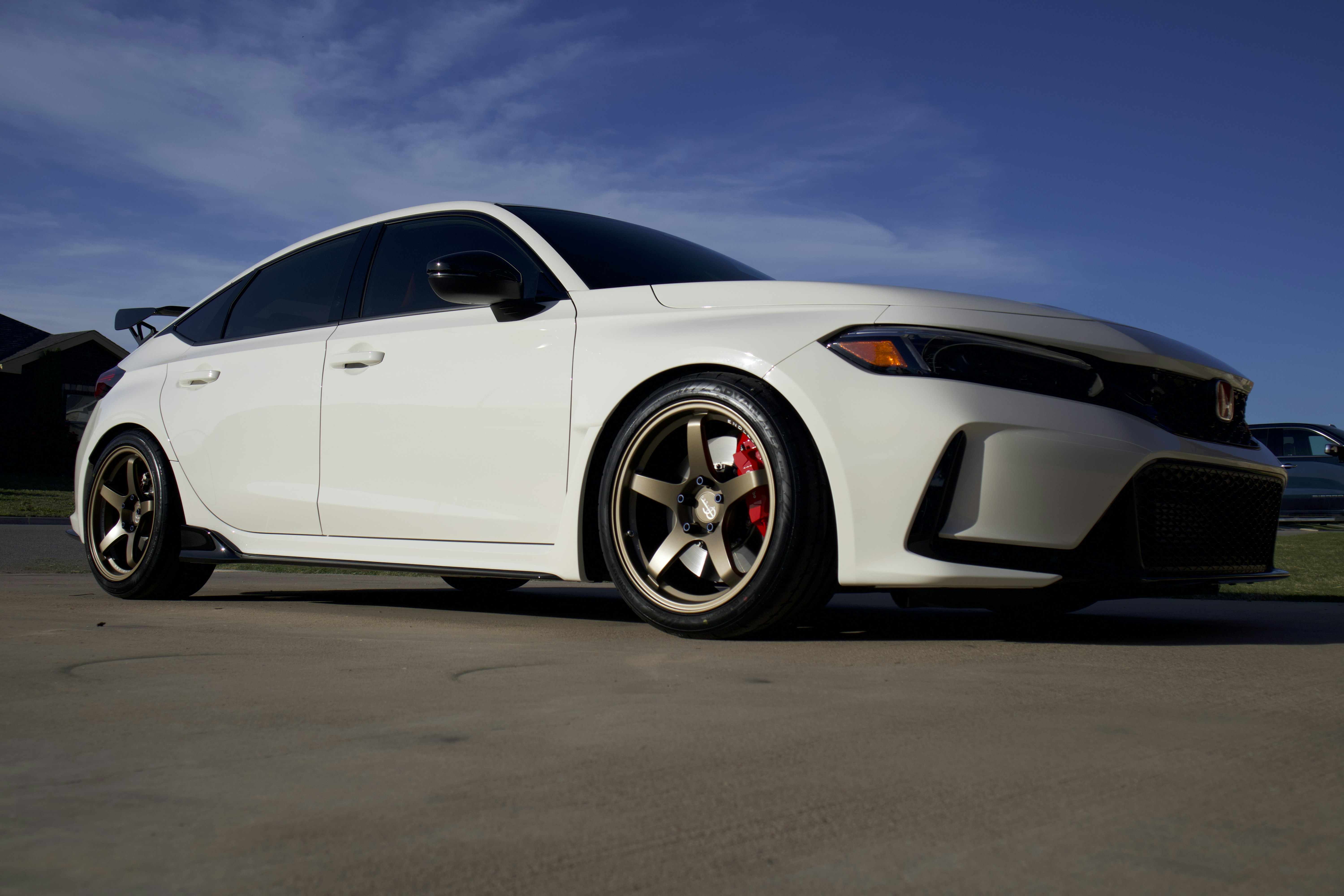 Sleek Elegance in Sunlit Asphalt