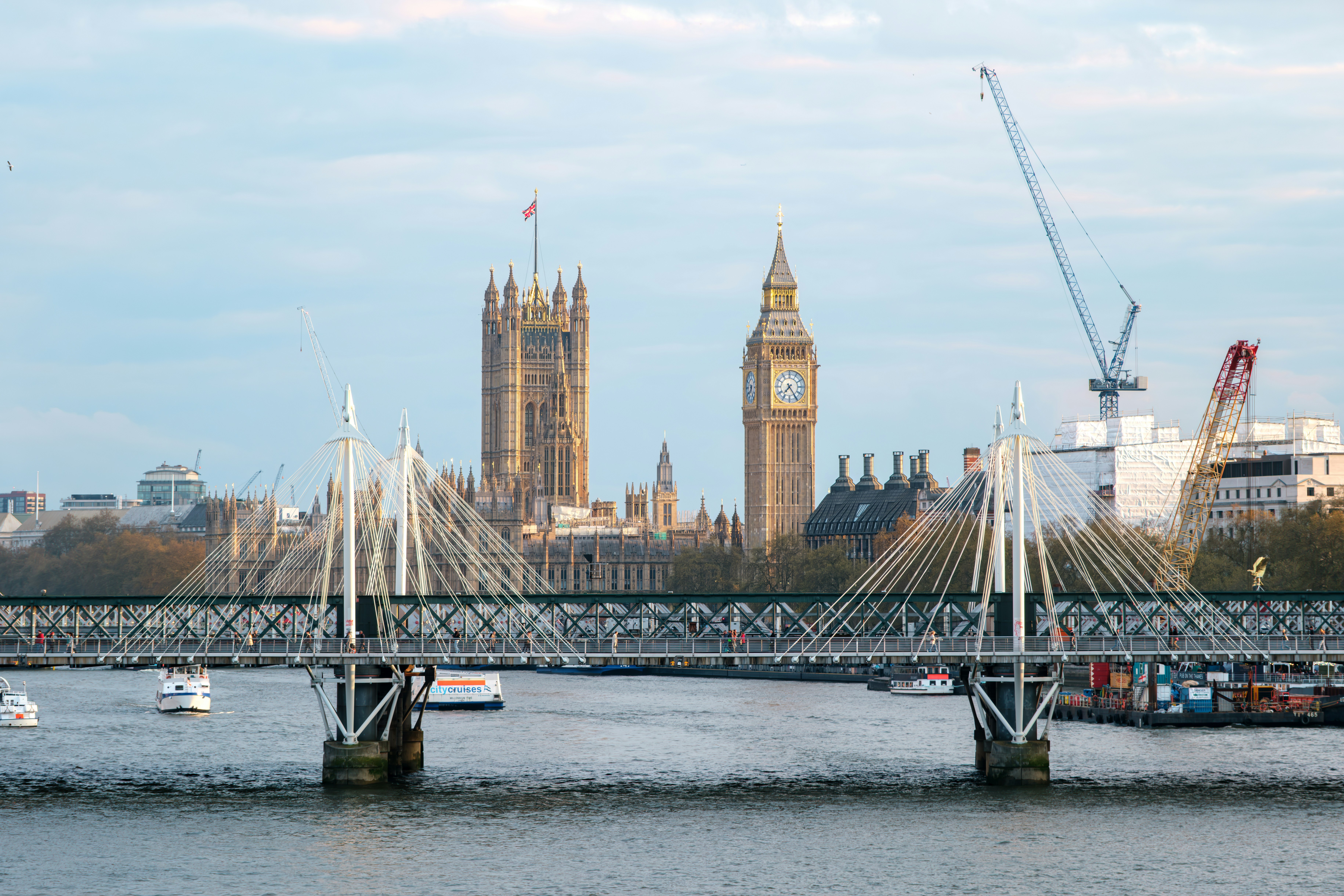 Across the Thames: Westminster and the Modern Bridge under a pale afternoon
