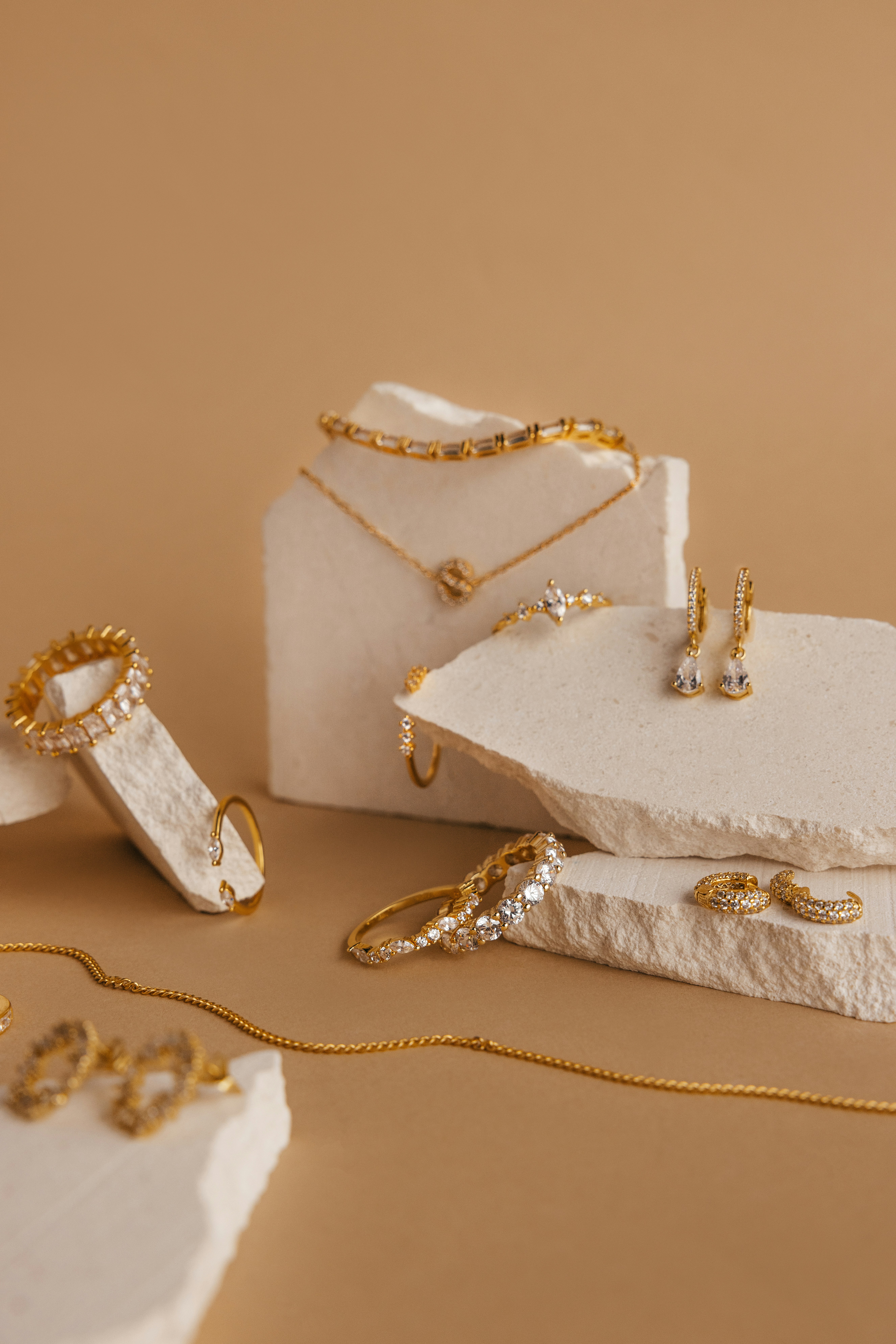 A bunch of jewelry sitting on top of a table photo – Free Jewelry Image ...