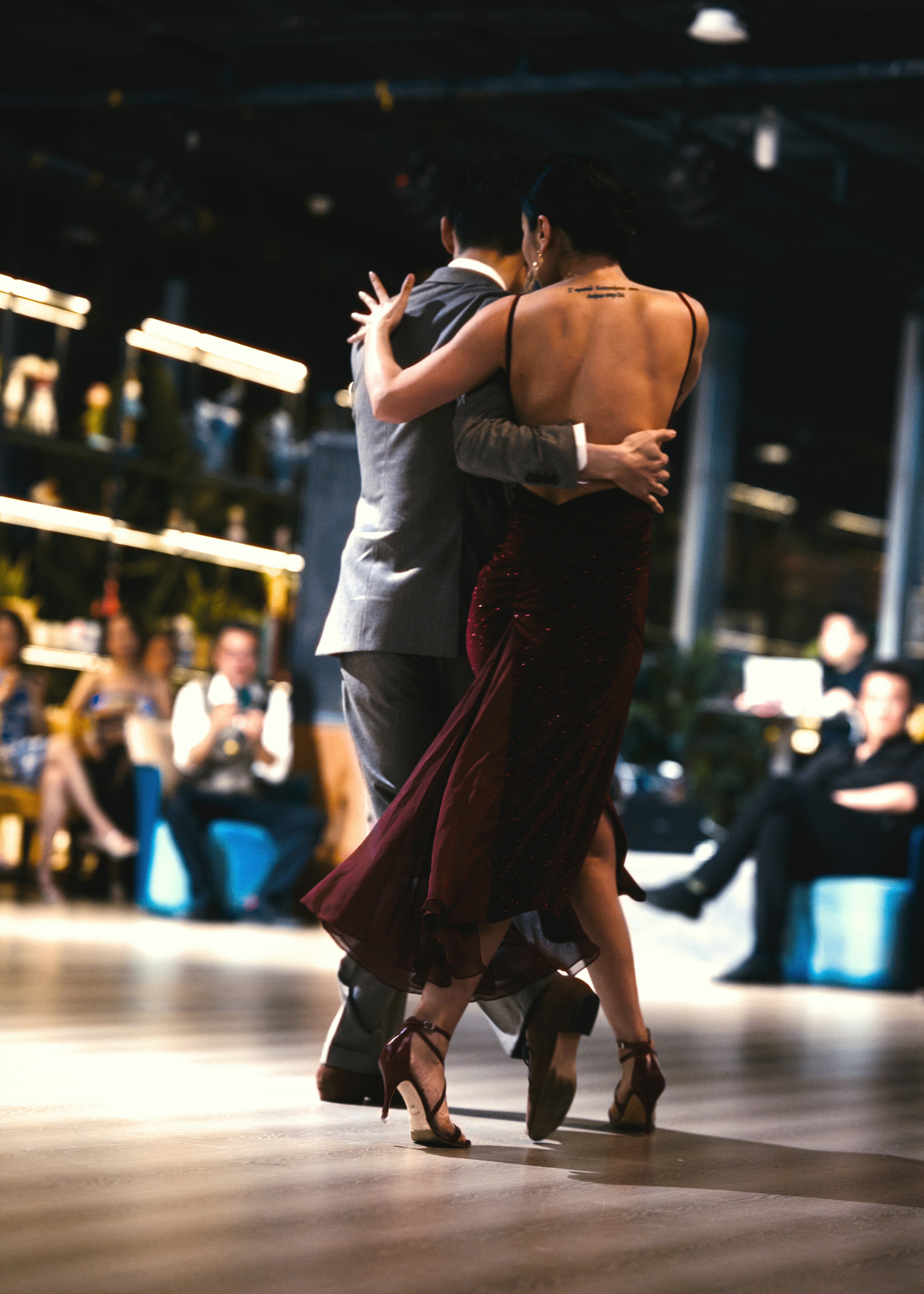 A couple of people that are dancing on a dance floor photo – Free ...