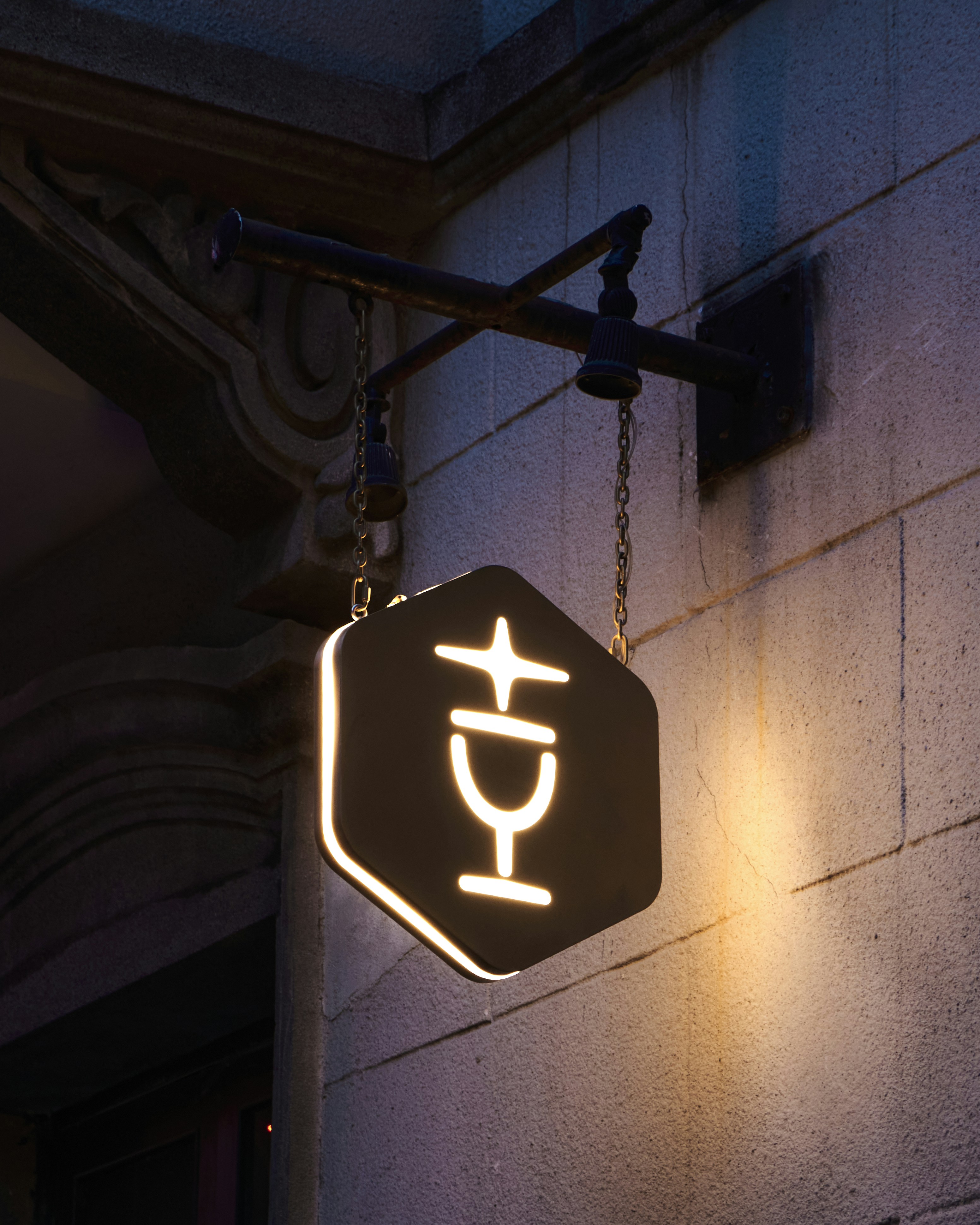 Night Neon Hex Sign: A Glowing Cocktail Emblem on Brick