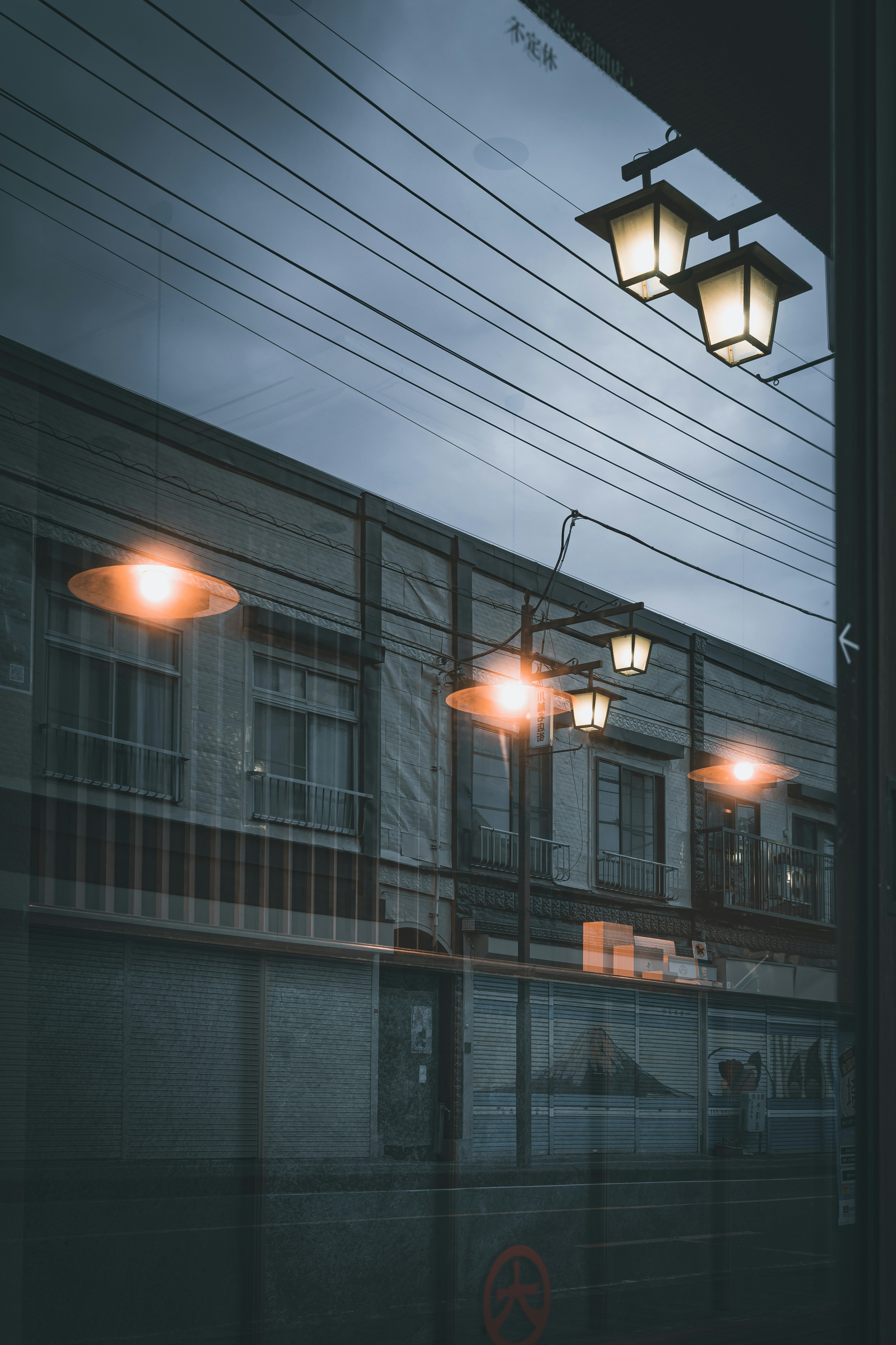 Neon Lanterns and Reflections on a Quiet Urban Night