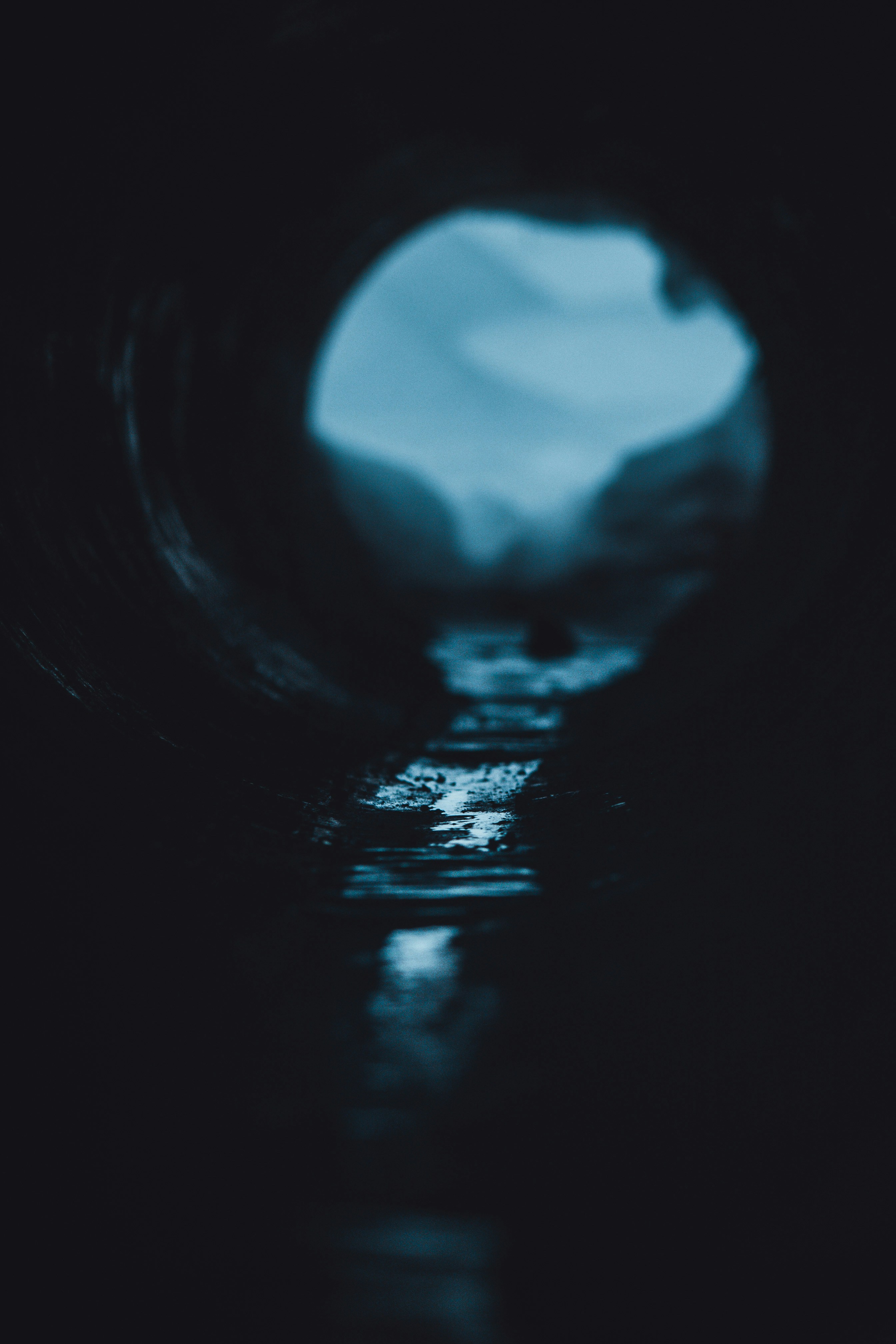 Blue tunnel to daylight: a view through darkness