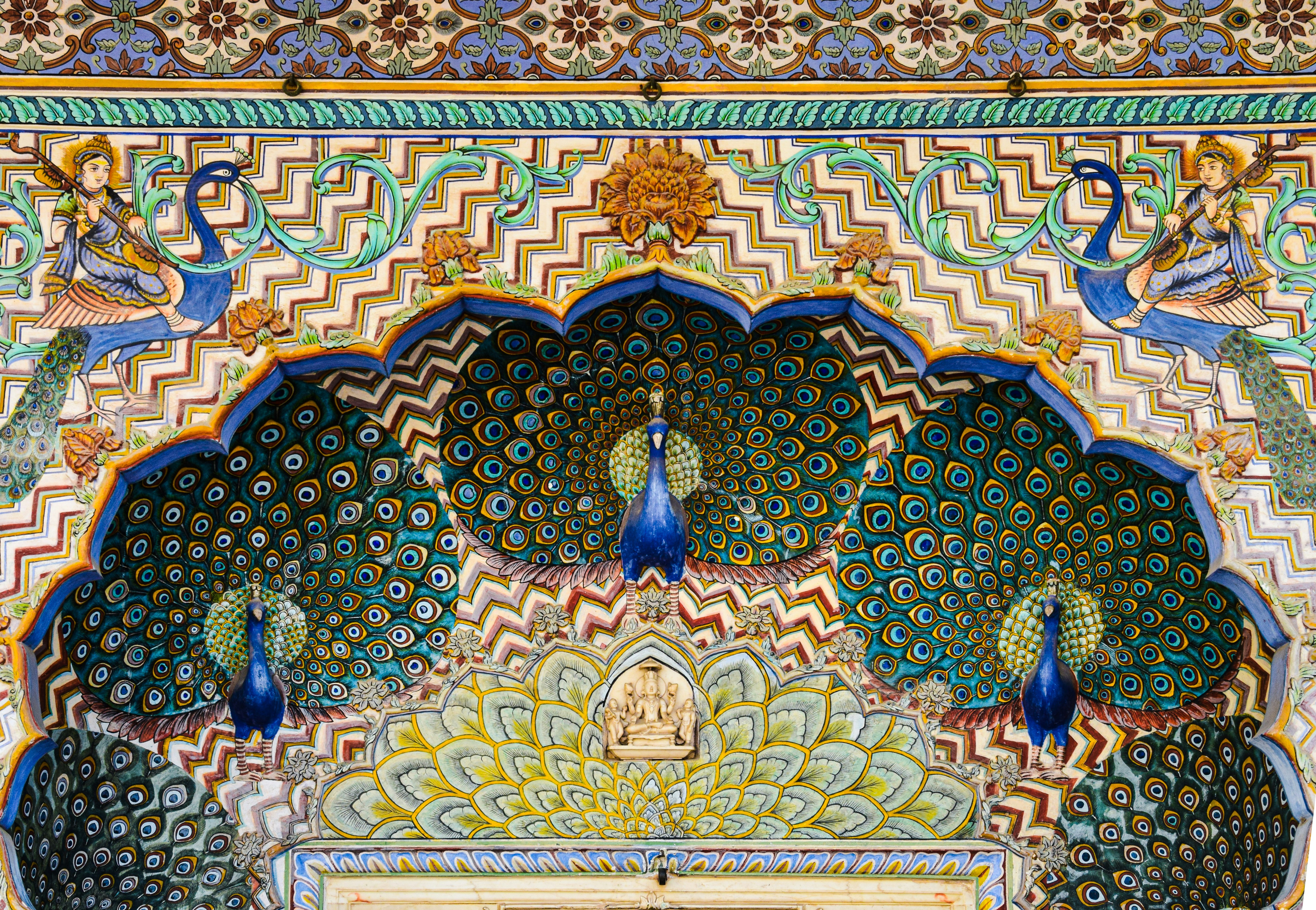 Peacocks are painted on the side of a building photo – Free Jaipur ...
