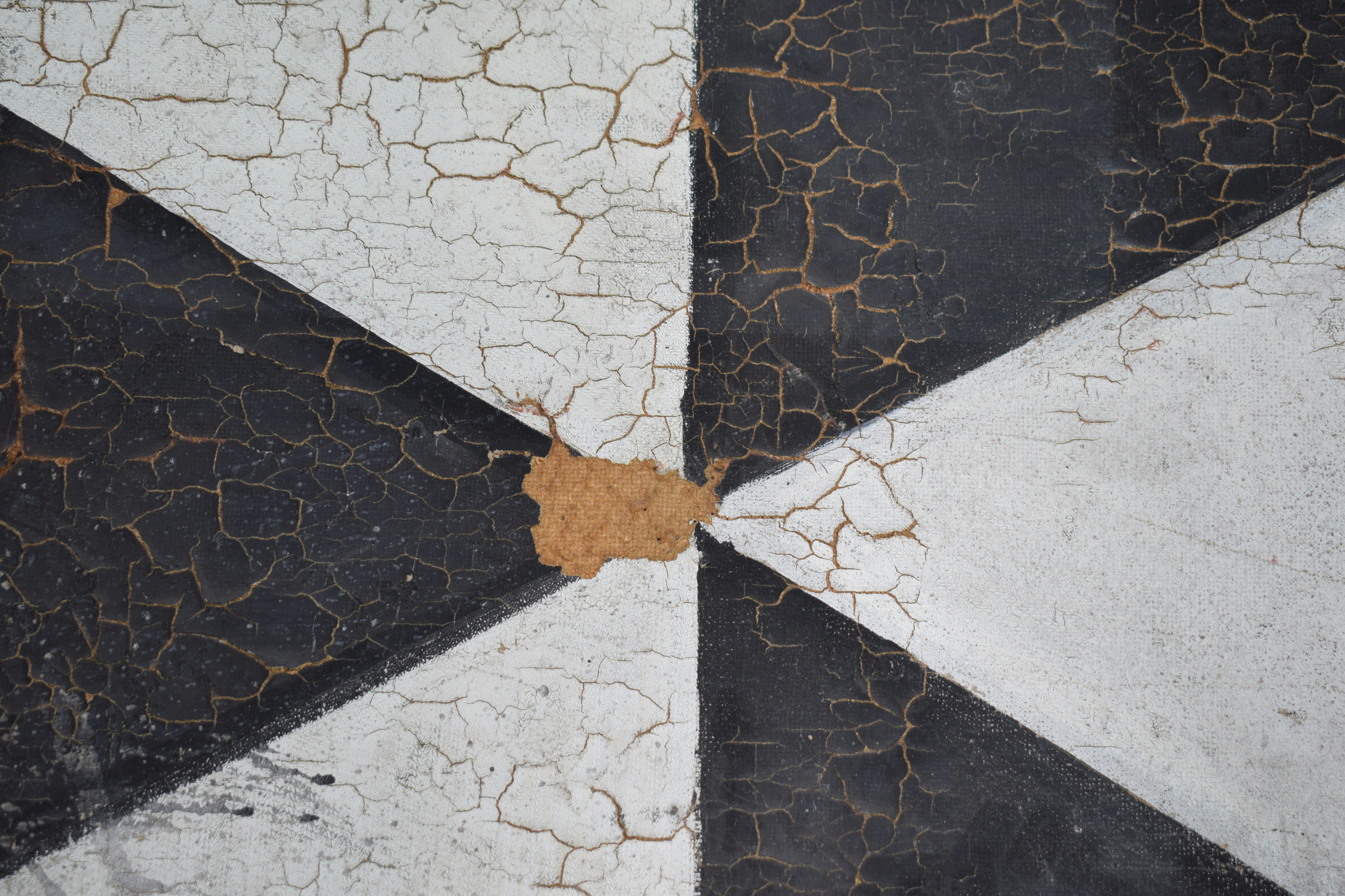 Cracked Symmetry: A Monochrome Corner in Flux