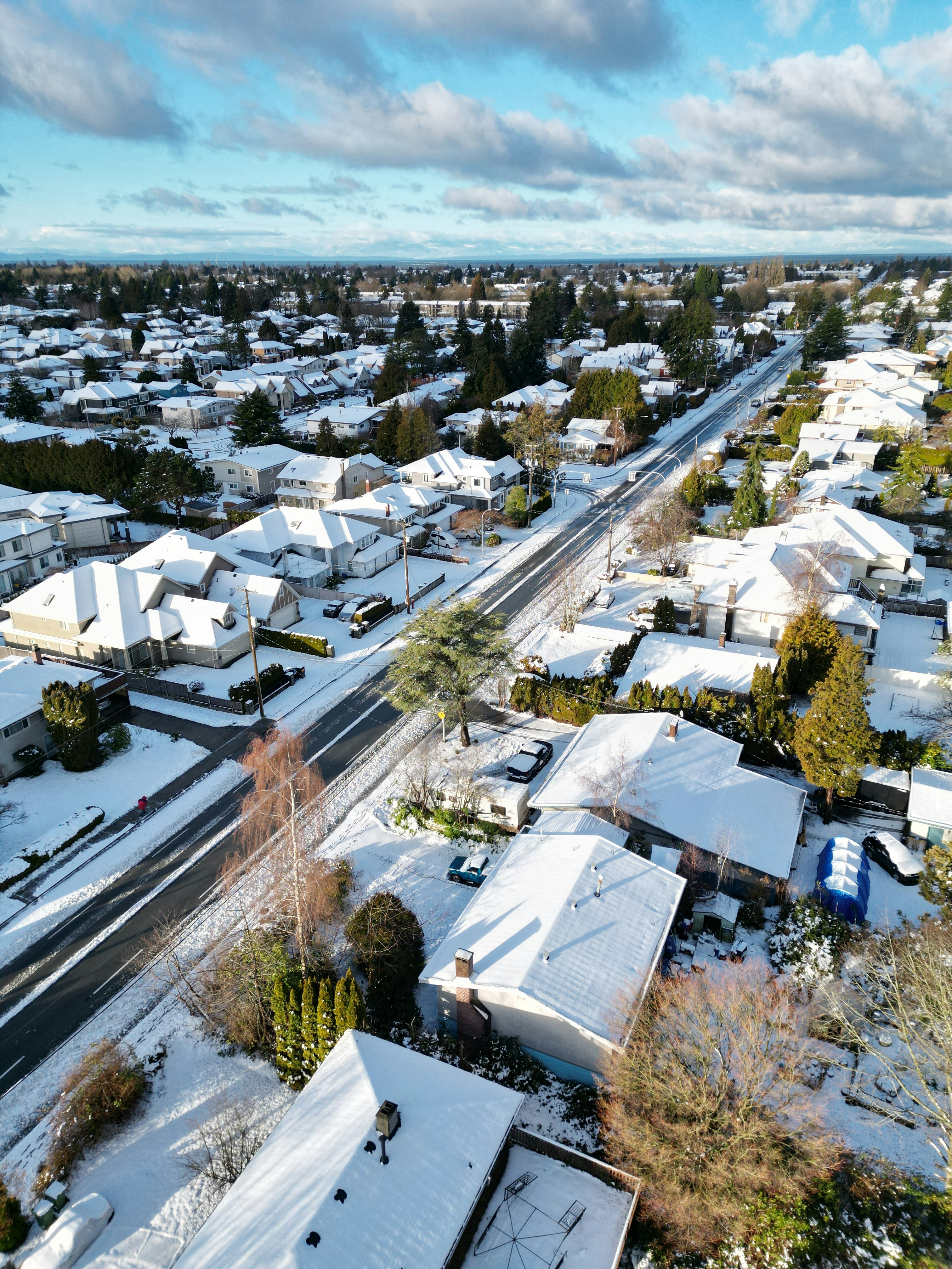 An aerial view of a snow covered neighborhood photo – Free Canada Image ...