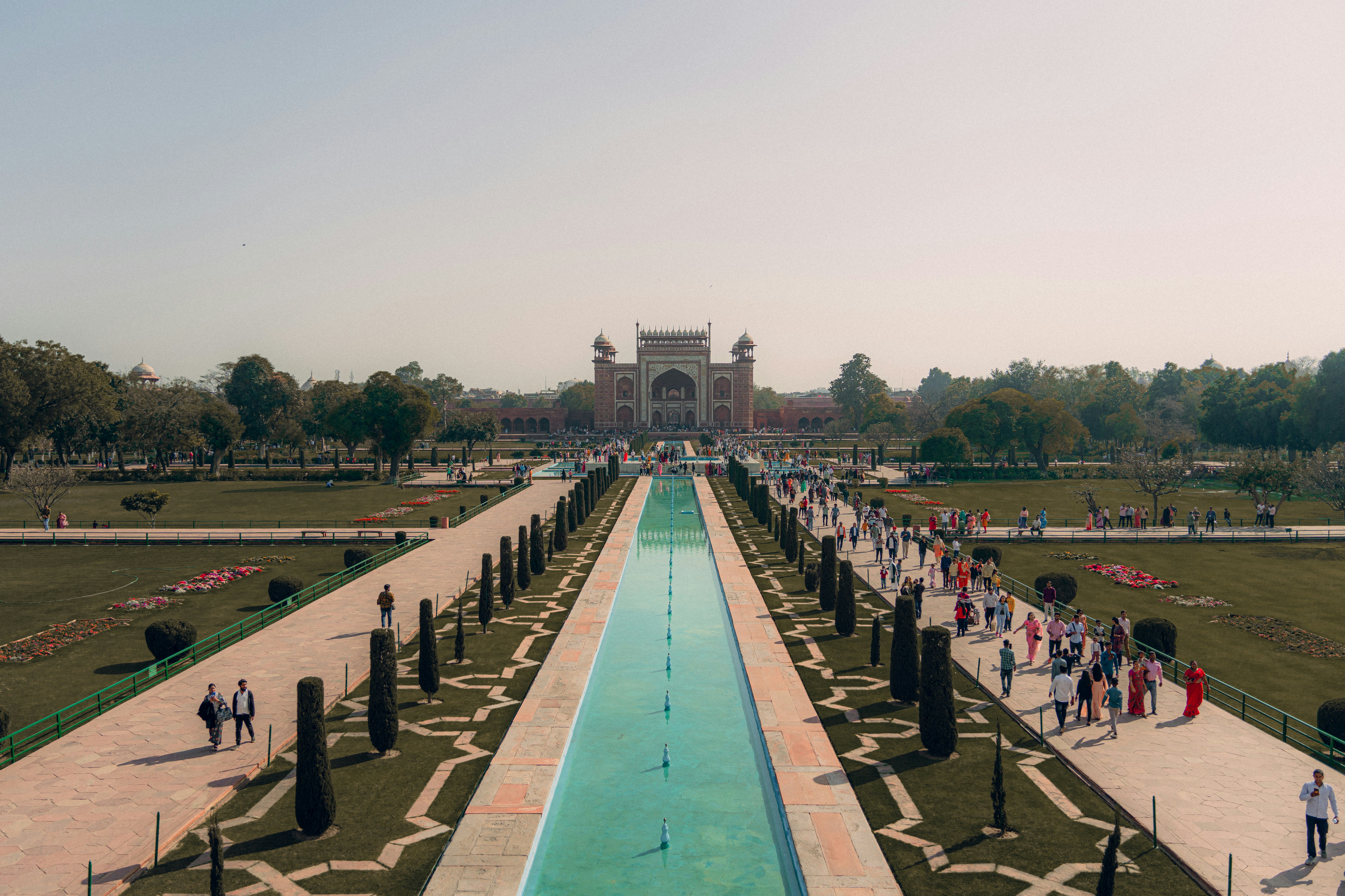 A long pool of water in the middle of a park photo – Free Taj mahal ...