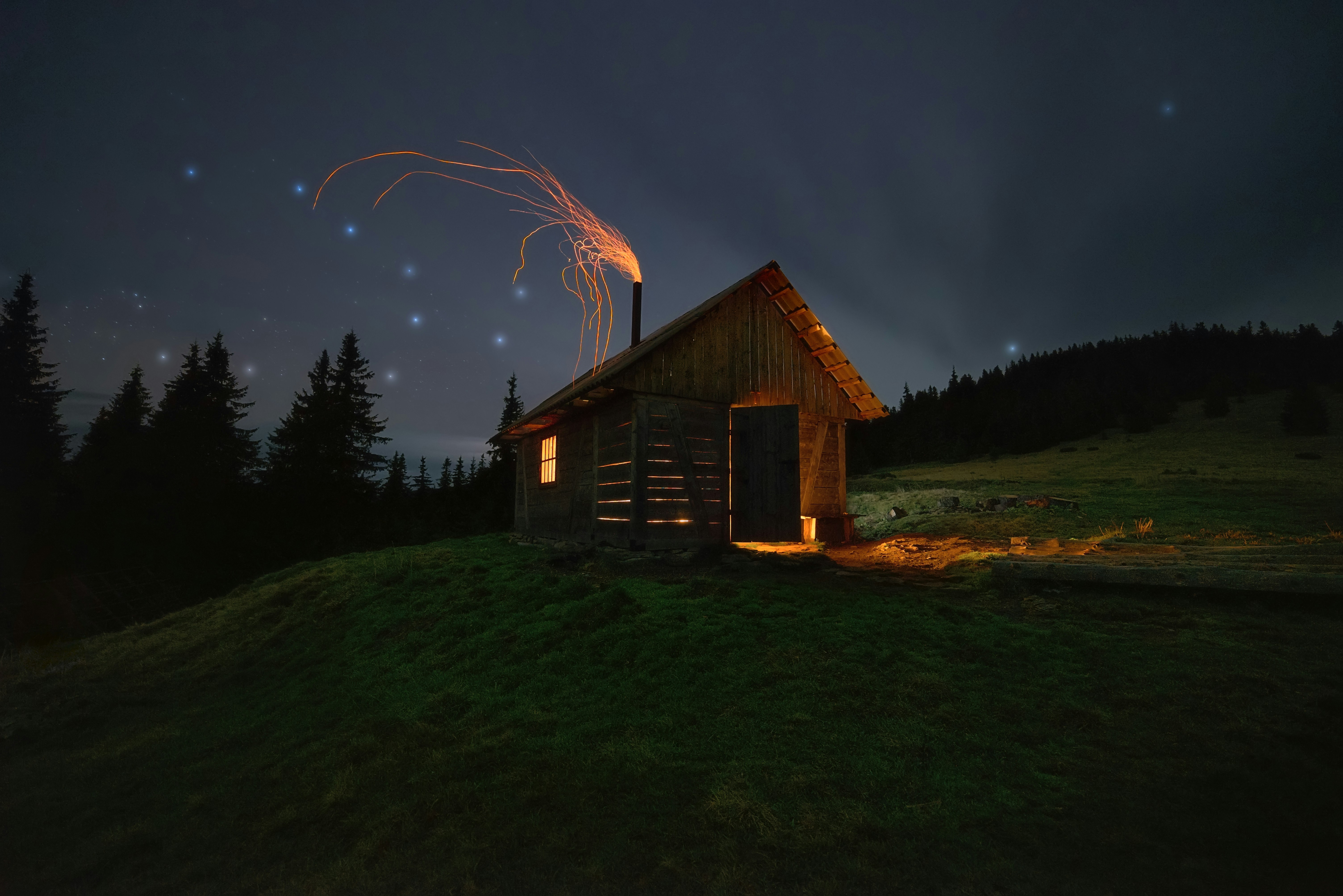 A small cabin on a hill at night photo – Free Shelter Image on Unsplash