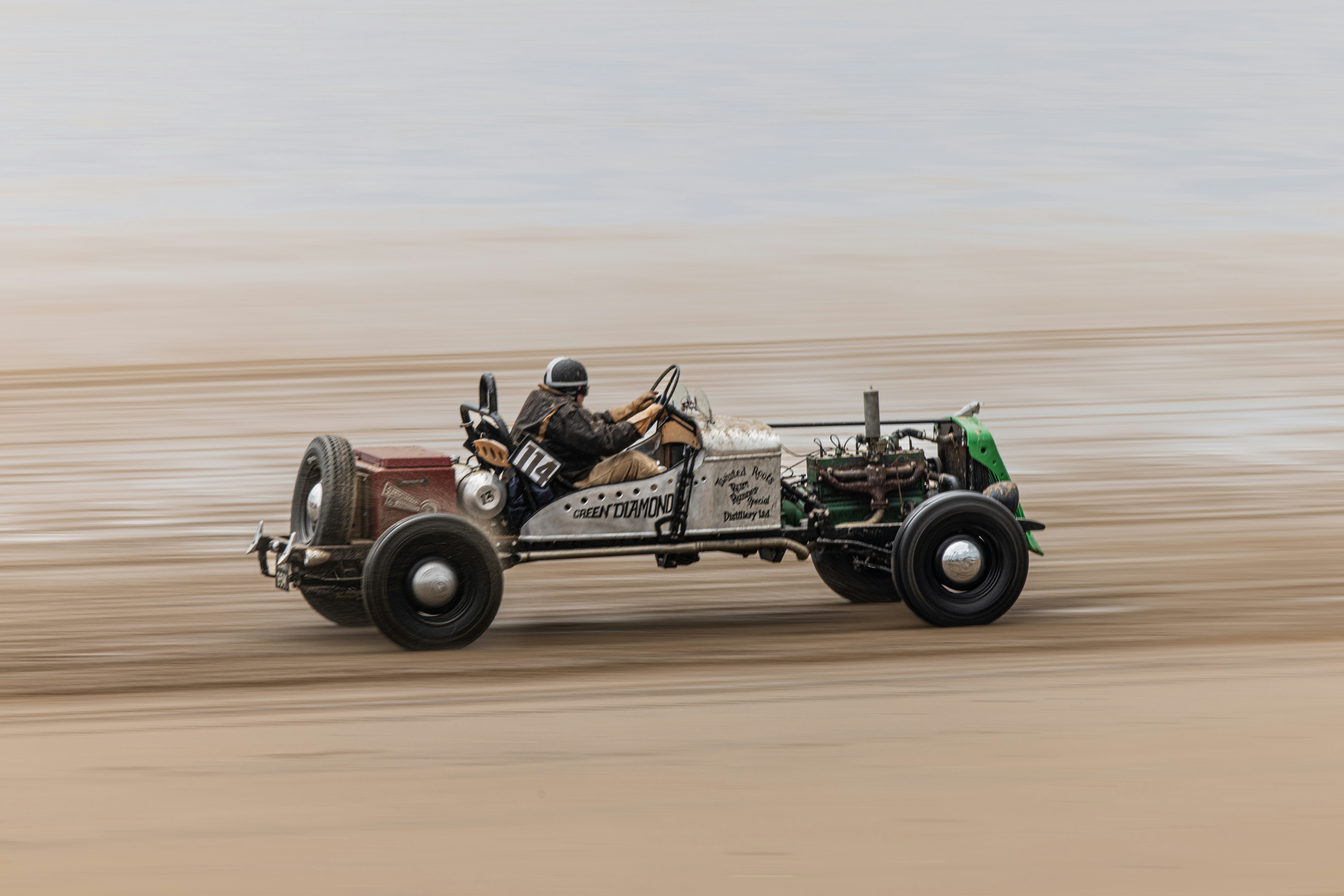 A man driving a buggy on a sandy beach photo – Free Bridlington Image ...