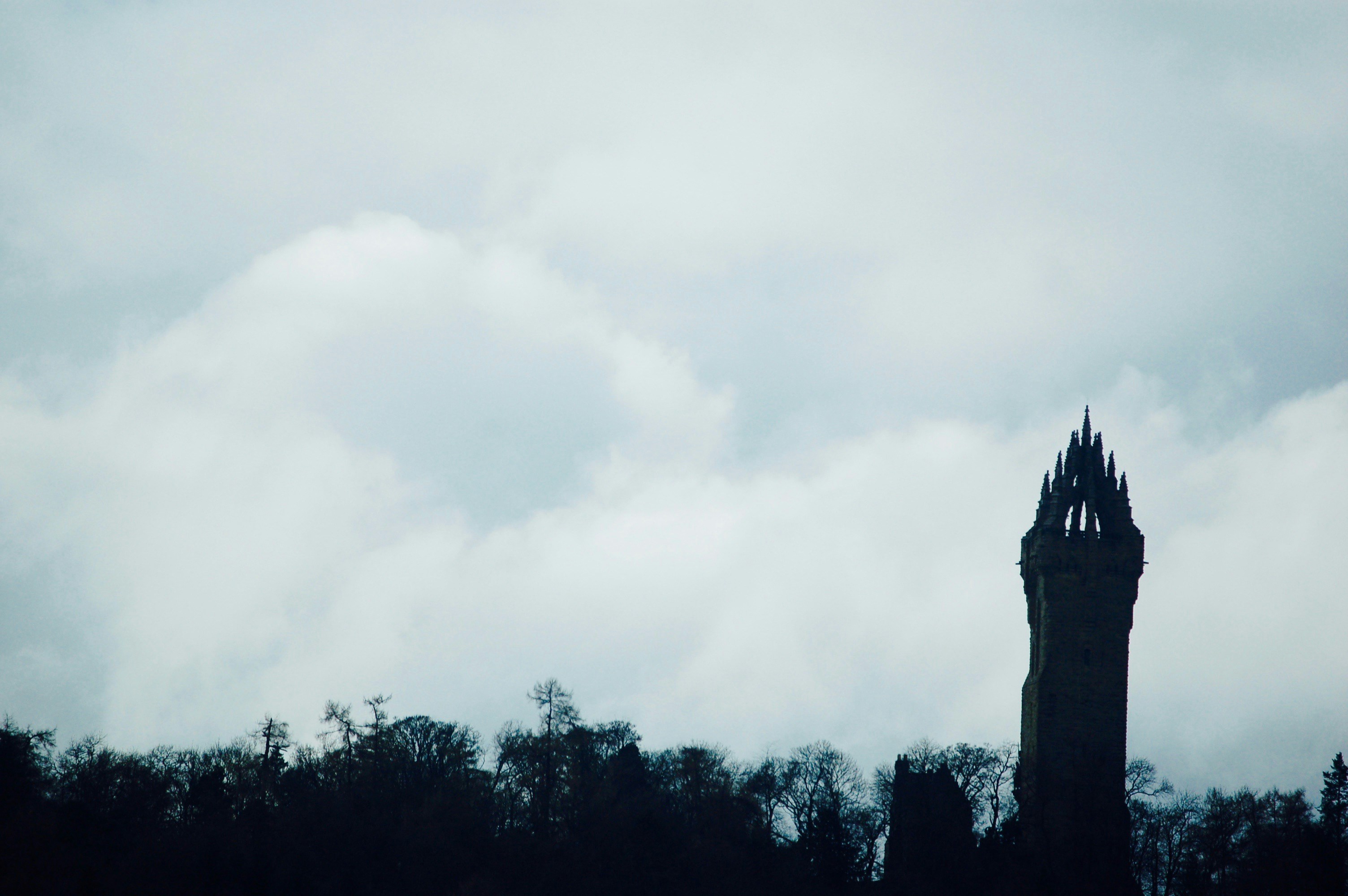 Spire Against the Cloud-Laden Horizon