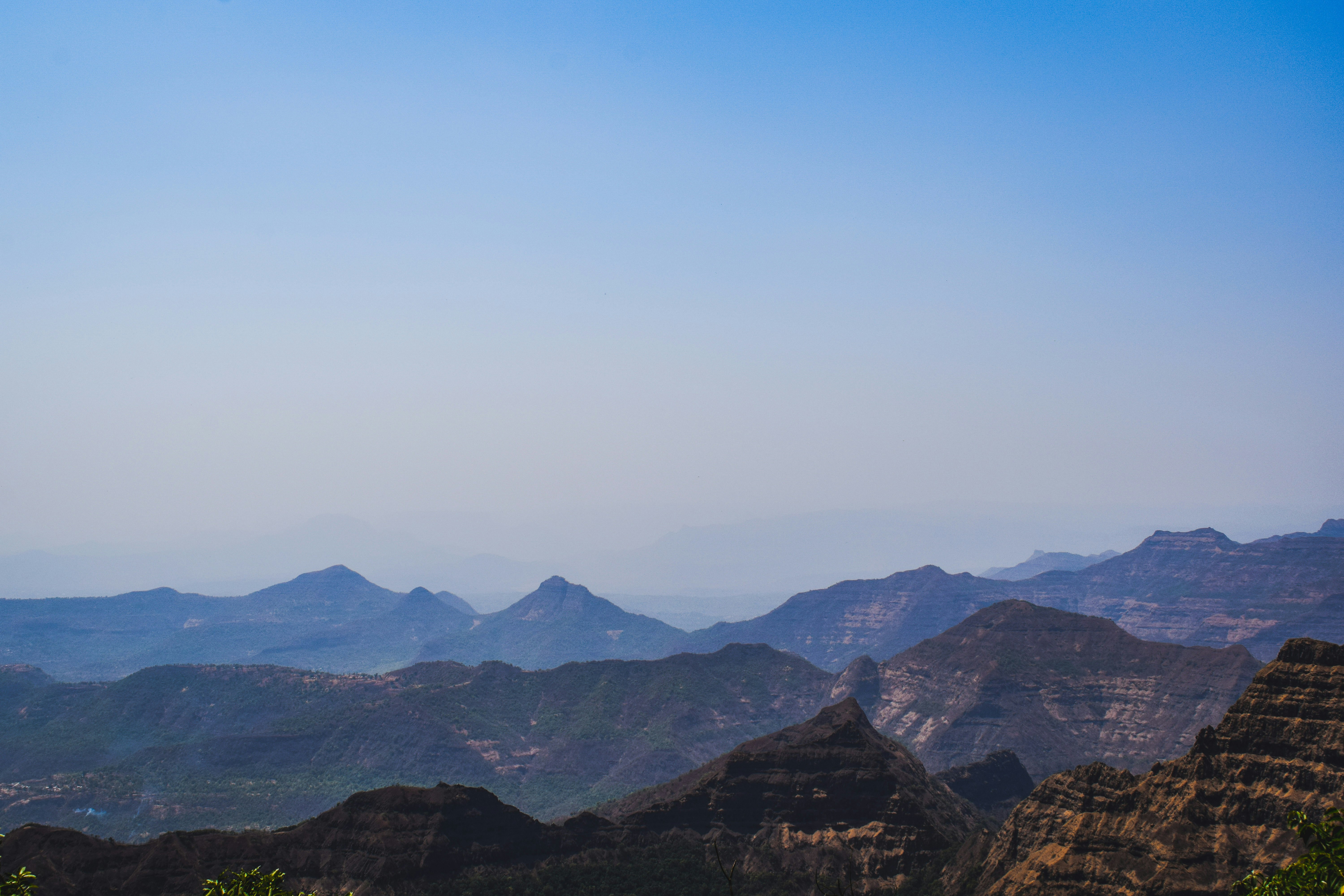 Blue Horizons Over Time-Worn Ridges