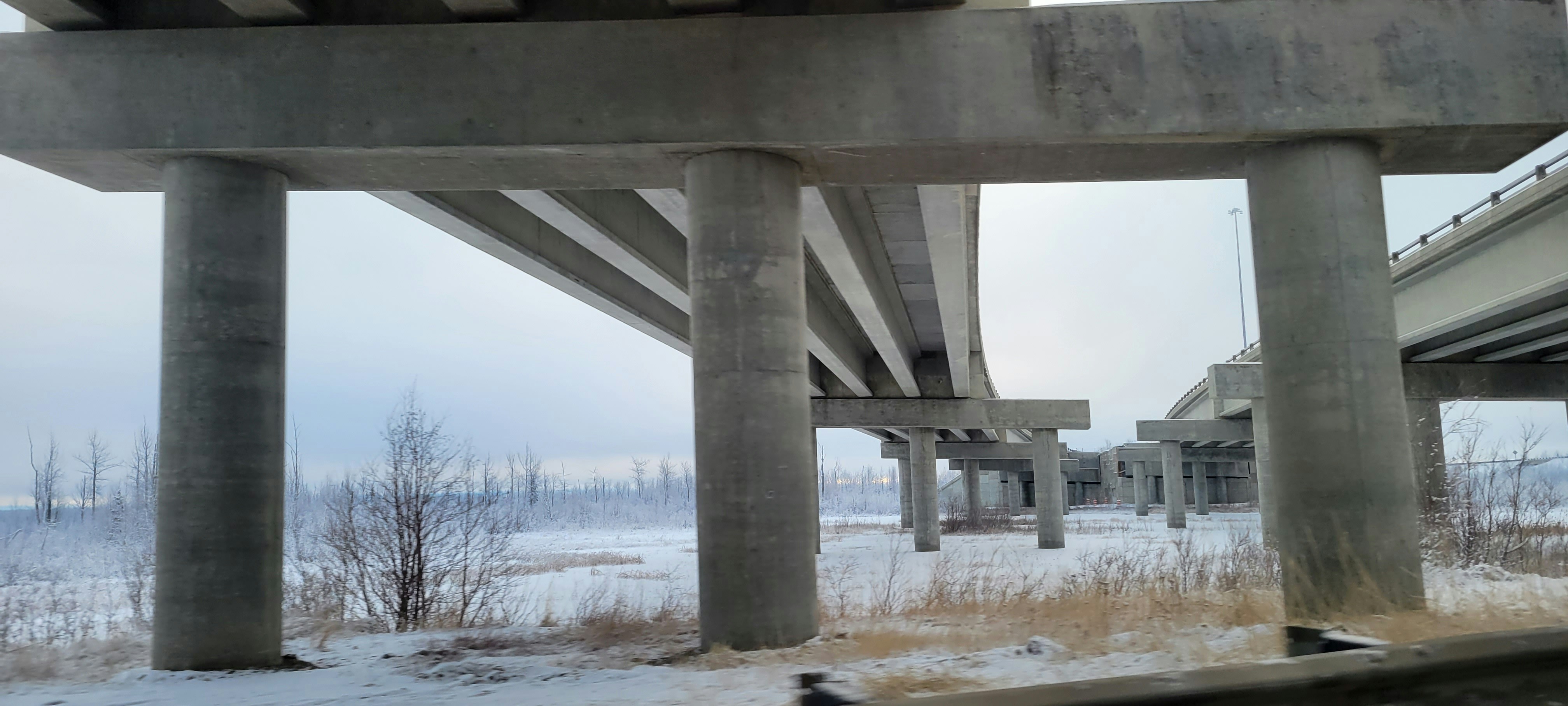 A view of a highway overpass in the winter photo – Free Freeway Image ...