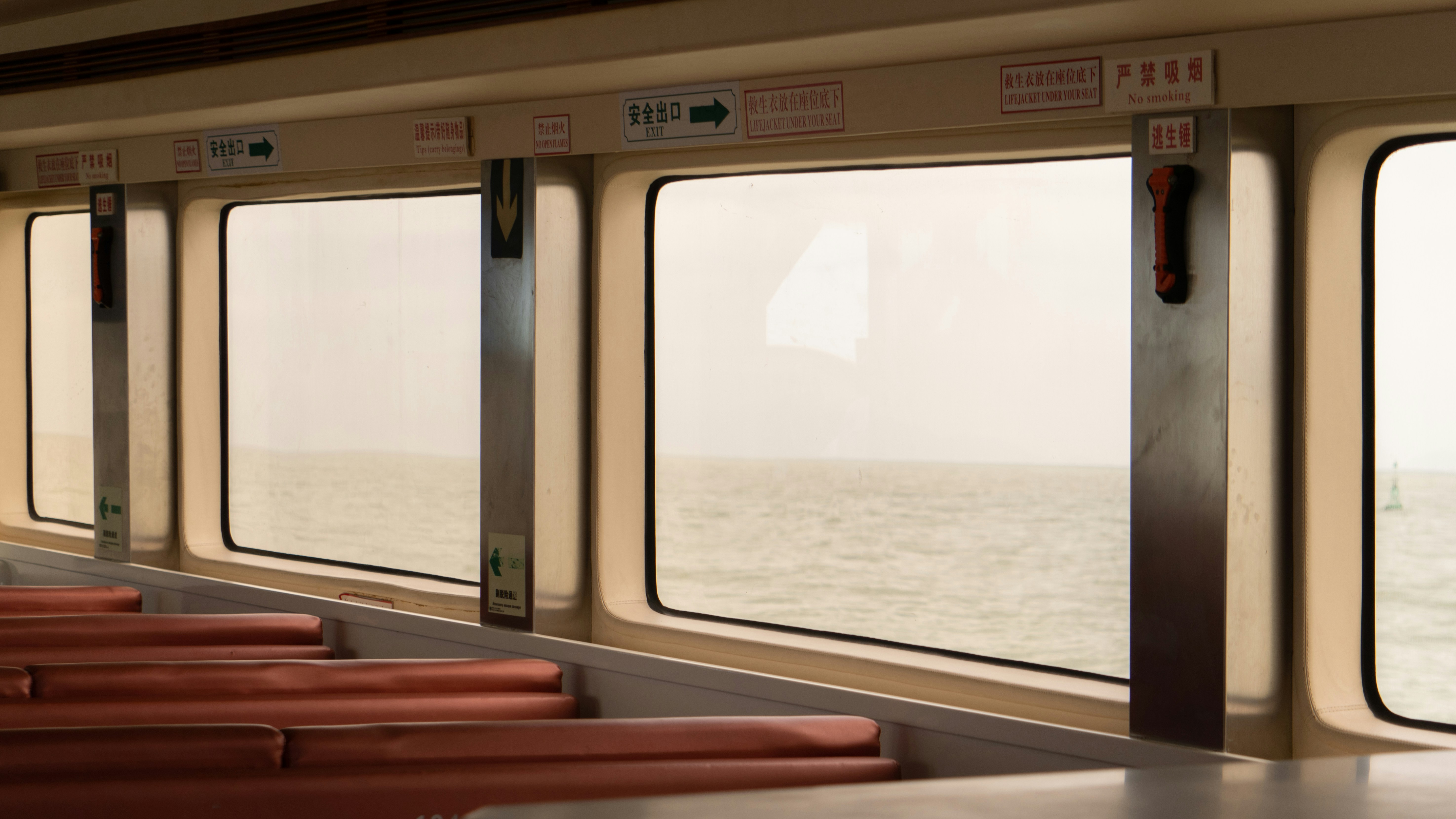 A view of the ocean from inside a train photo – Free Window Image on ...