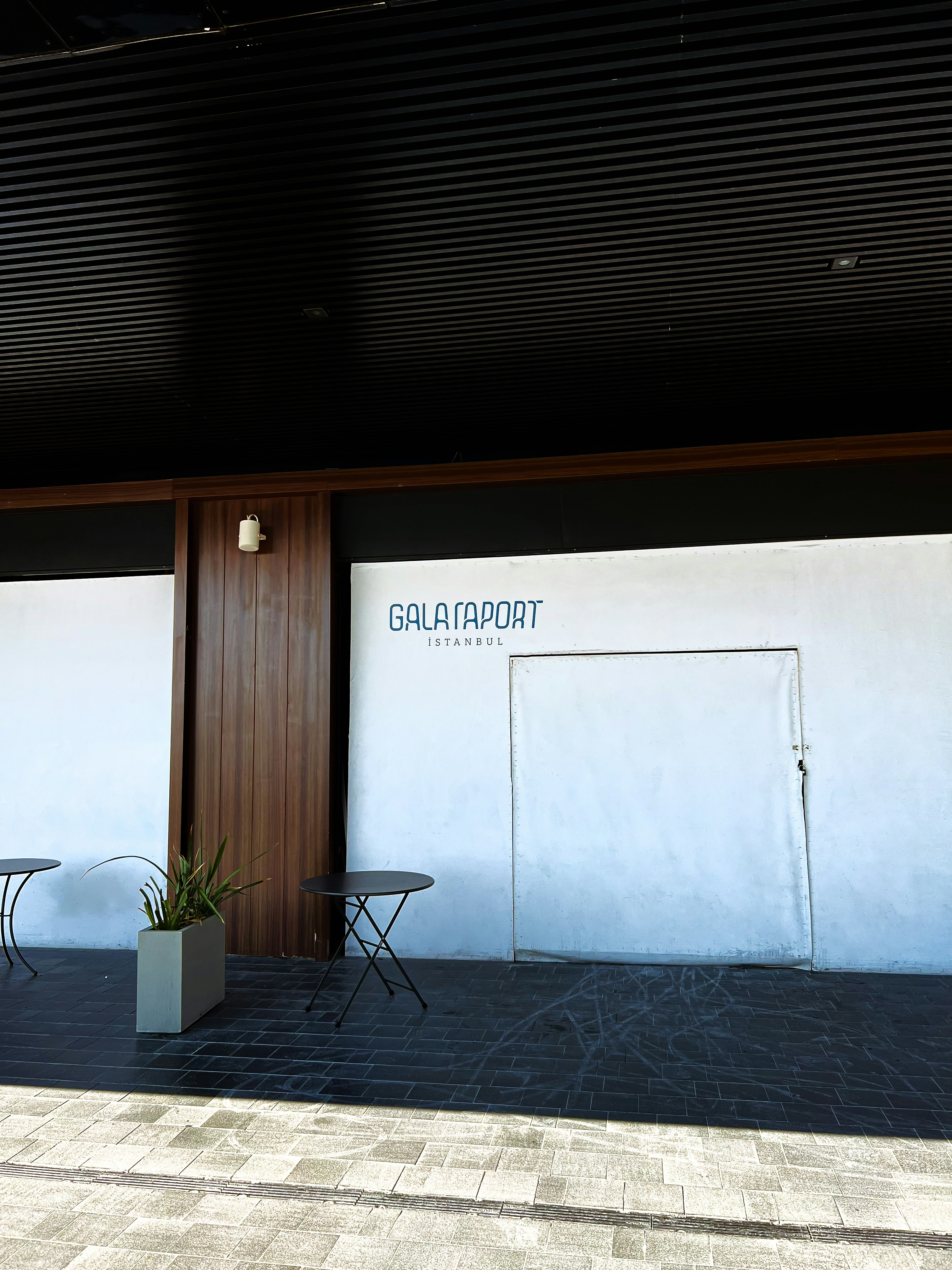 Galaport Facade: Quiet Geometry Under a Slatted Canopy
