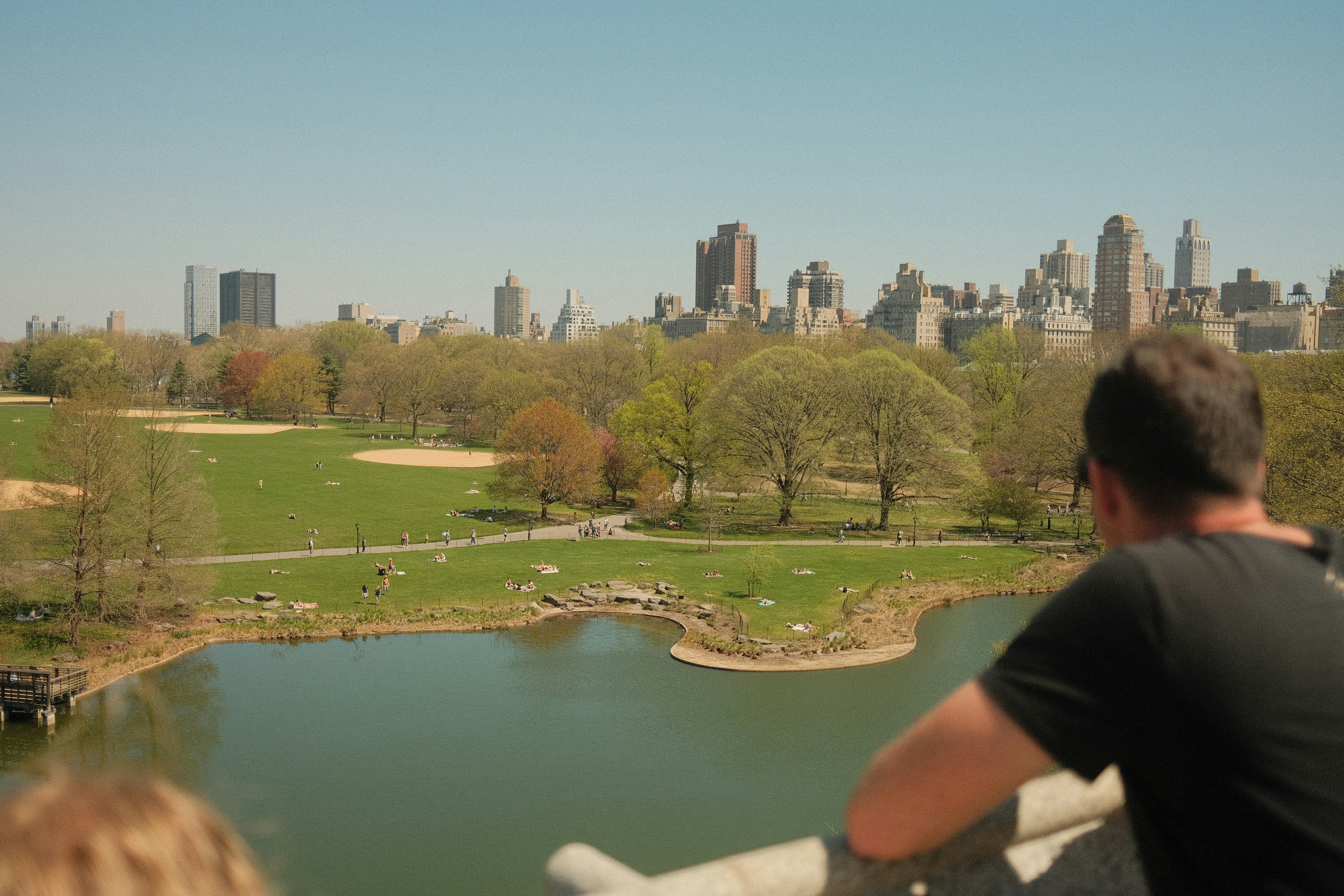 Bridge Rail Moment: Autumn Park Framing Manhattan's Skyline