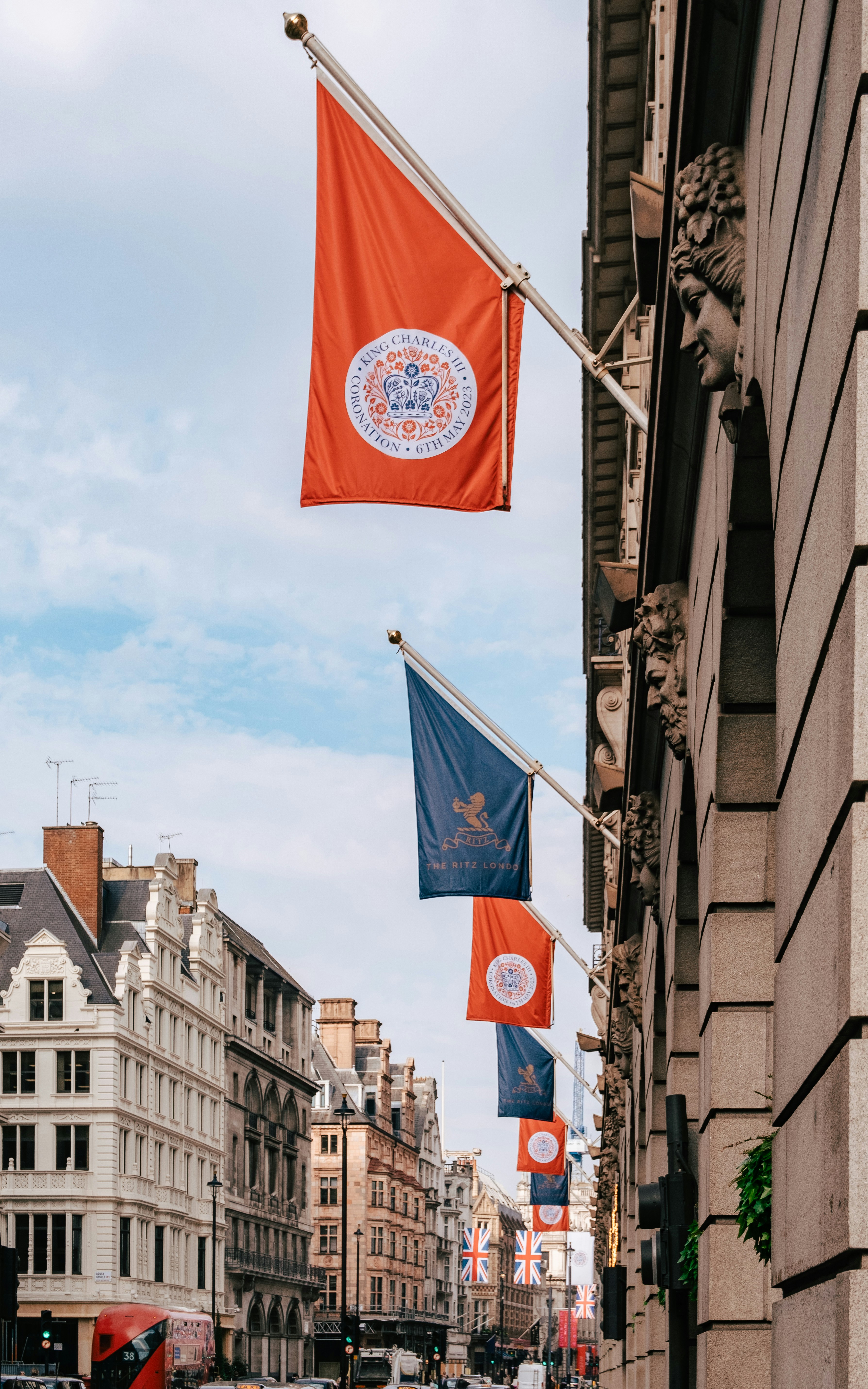 Flag Corridor: A London-esque Street Framed by Flags and Era-Worn Facades
