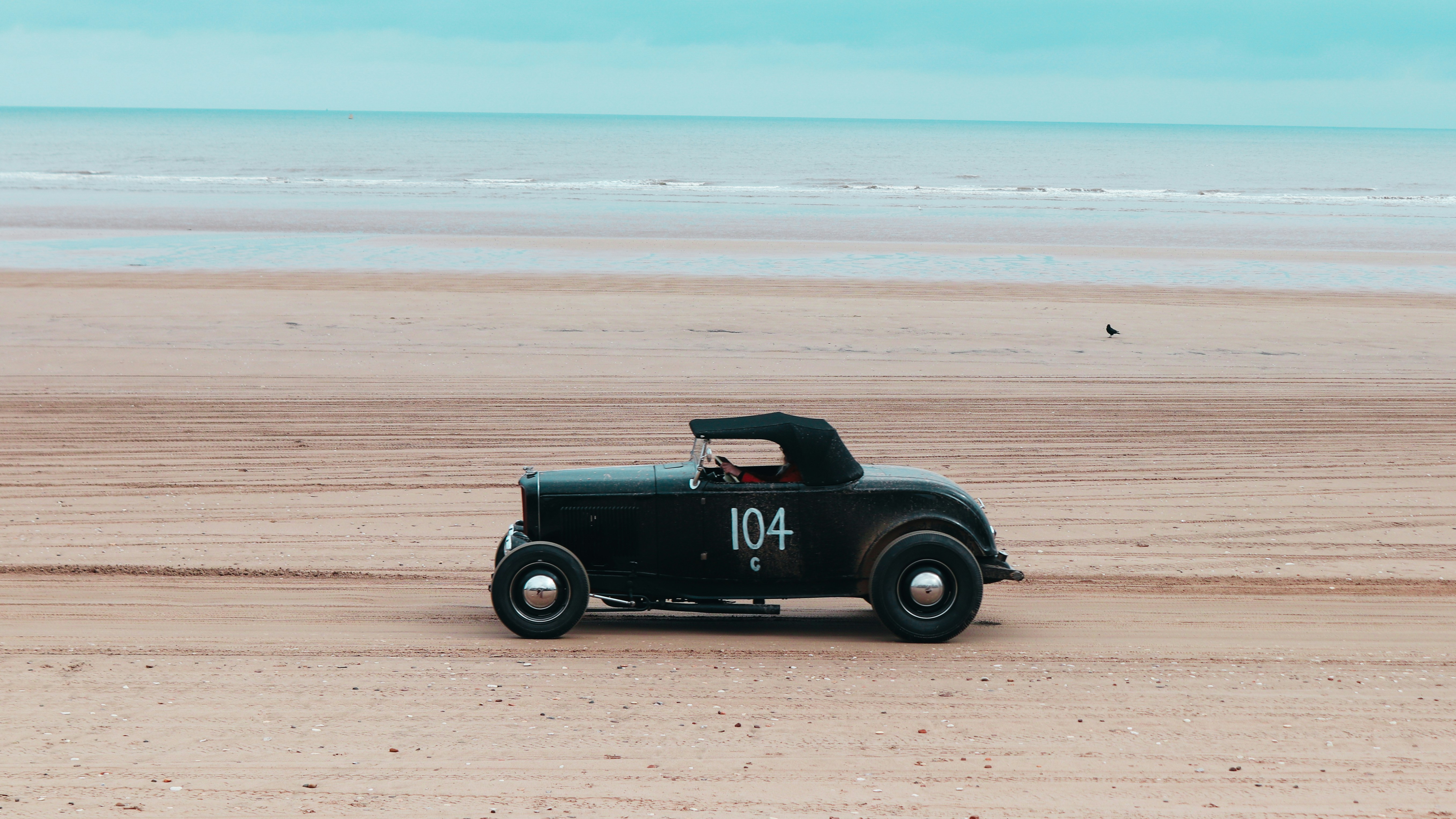 104 on the Dune: A Vintage Coupe Graces a Quiet Seaside