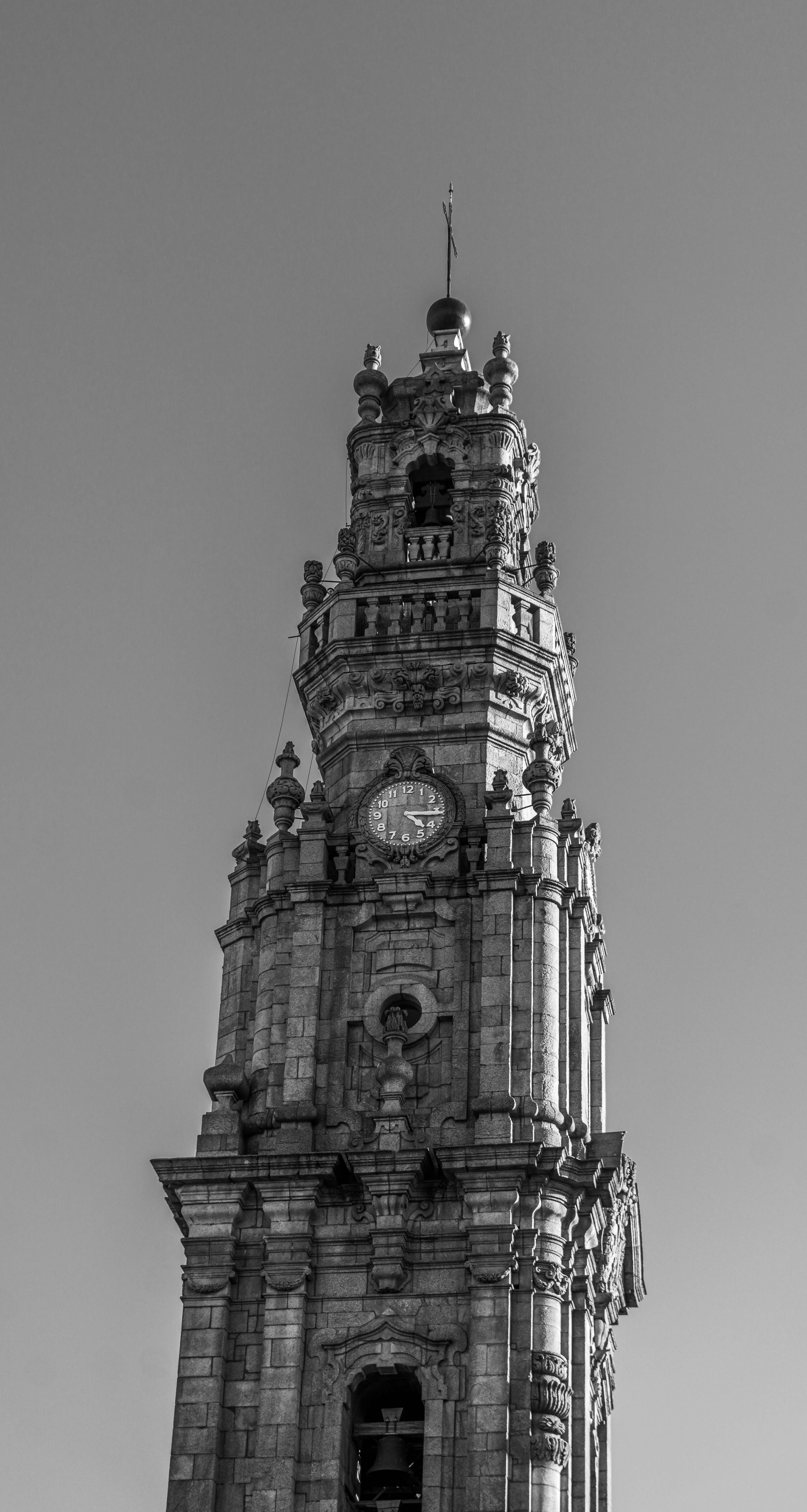 a black and white photo of a clock tower