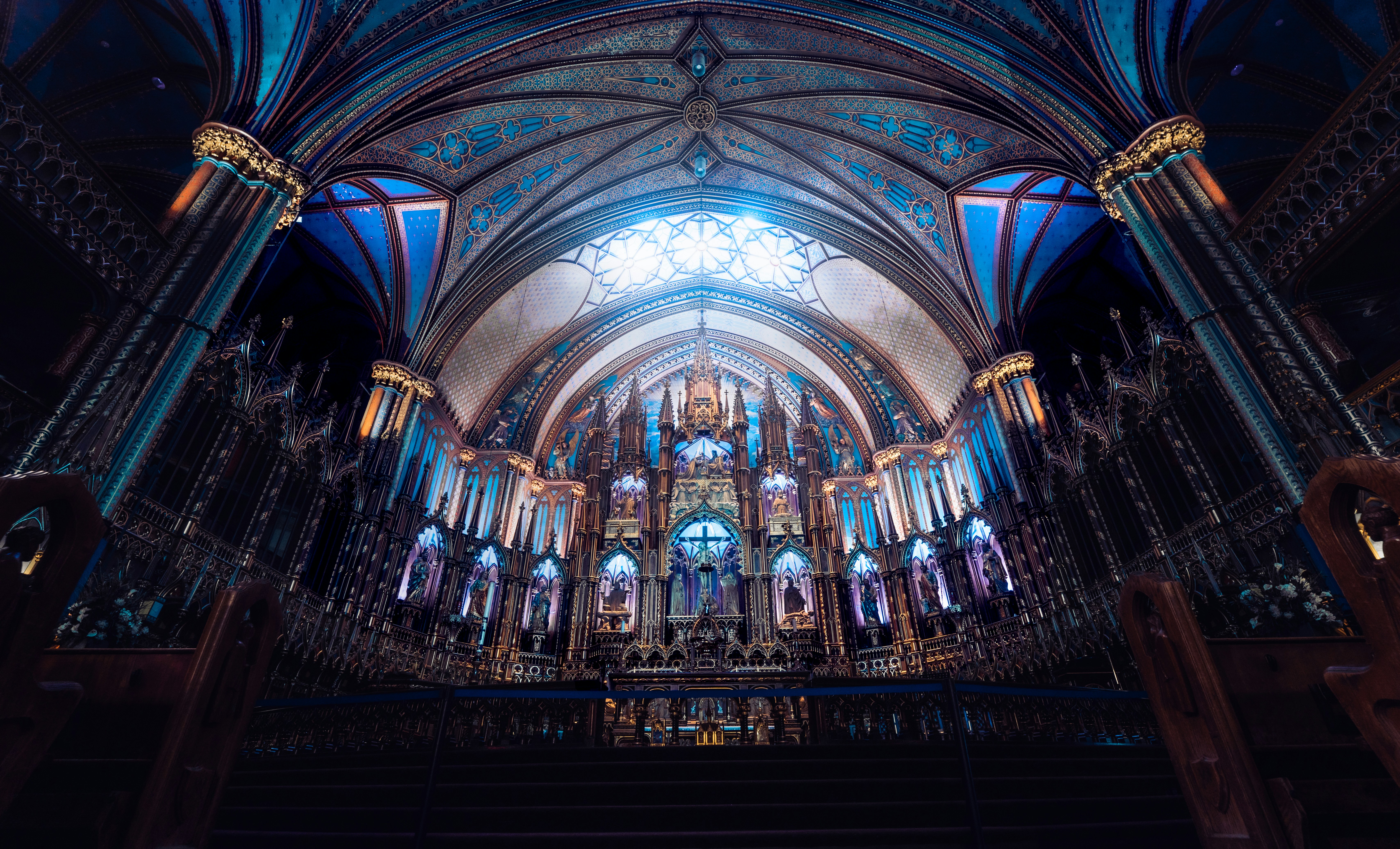 quite the interior isn't it | a large cathedral with a blue and white ceiling