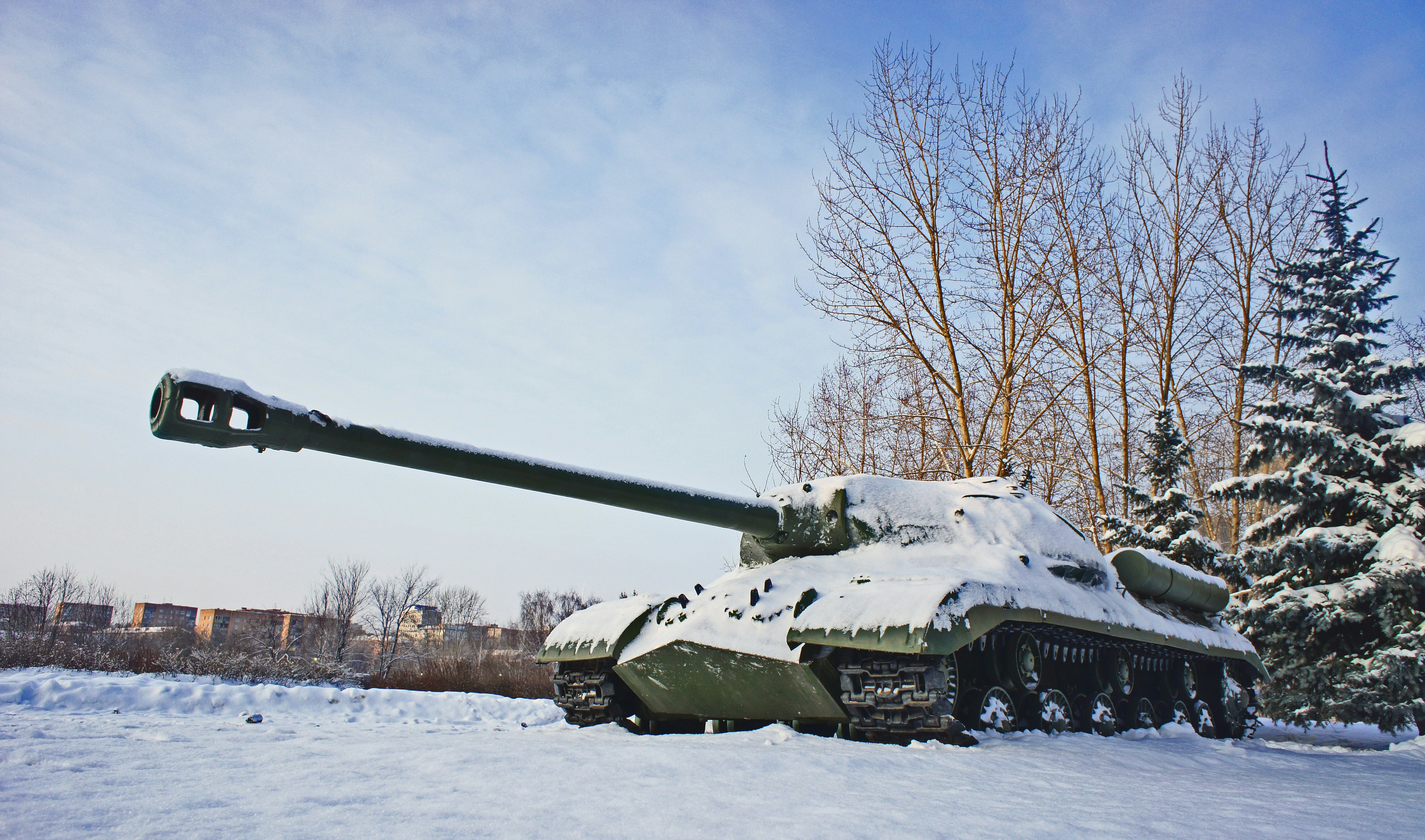 Snowbound Behemoth: A Tank Resting in Winter's Quiet Field