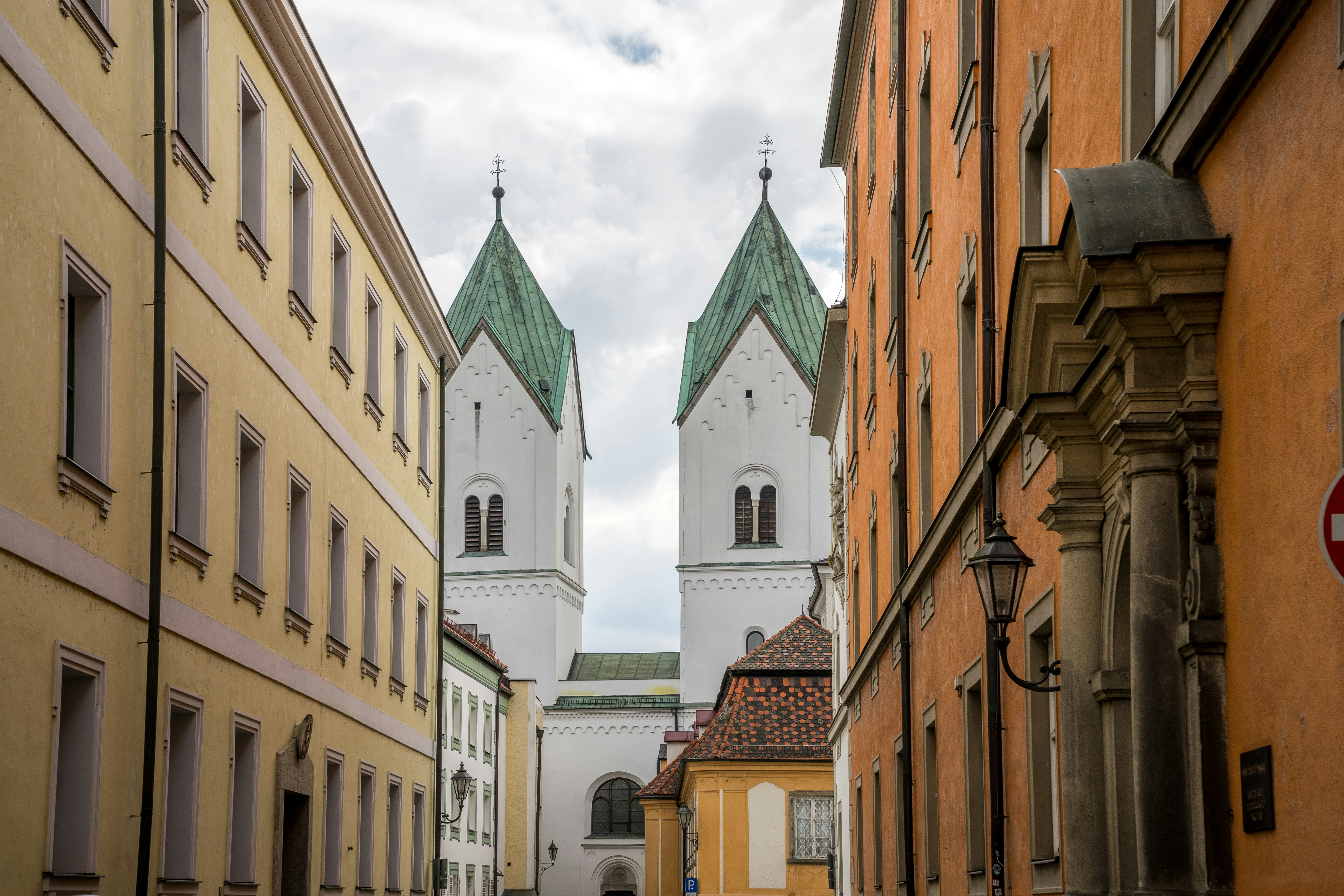 Historic Spires Amidst Urban Alleyways
