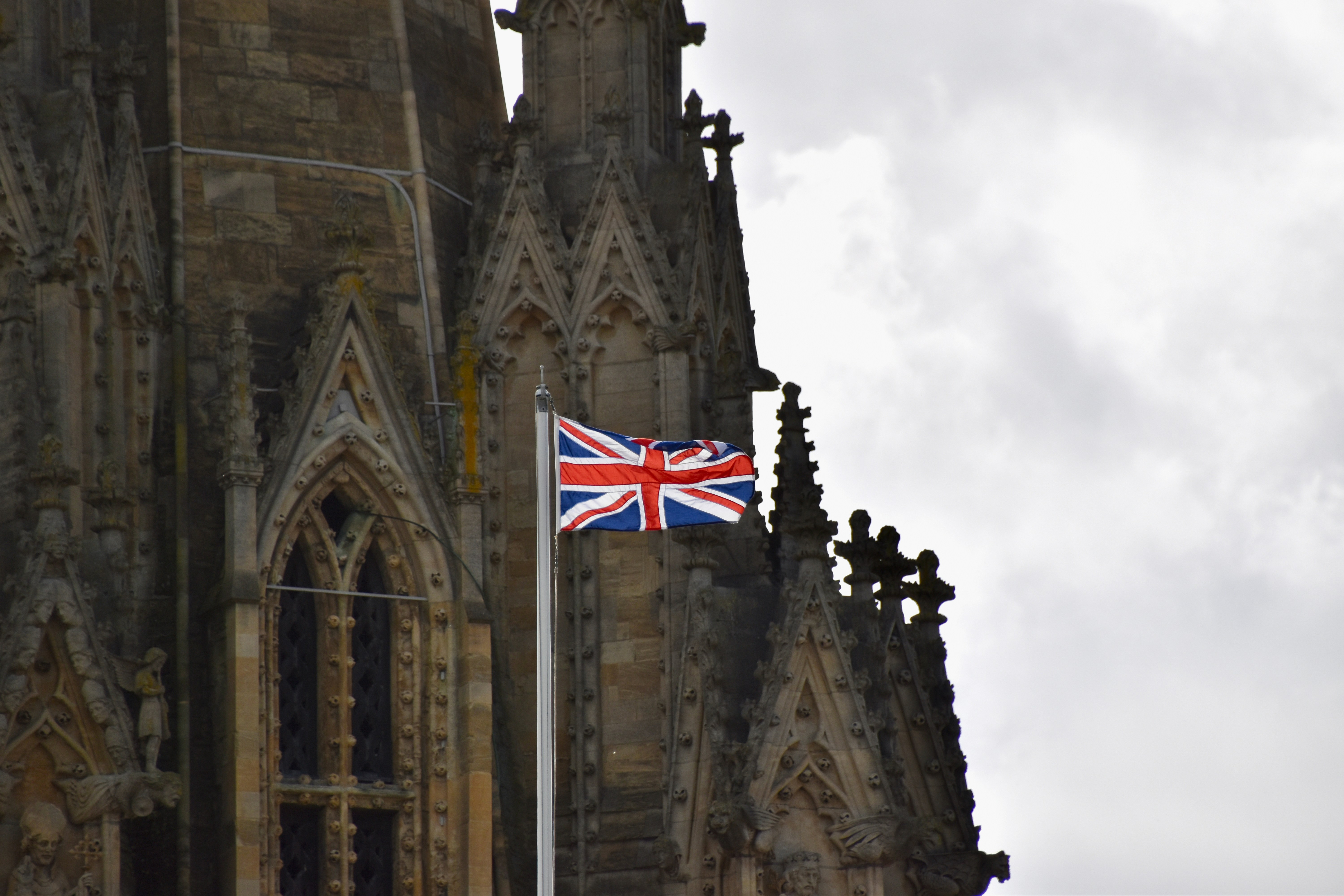 Union Flag Framing Gothic Spires: A Cathedral Moment