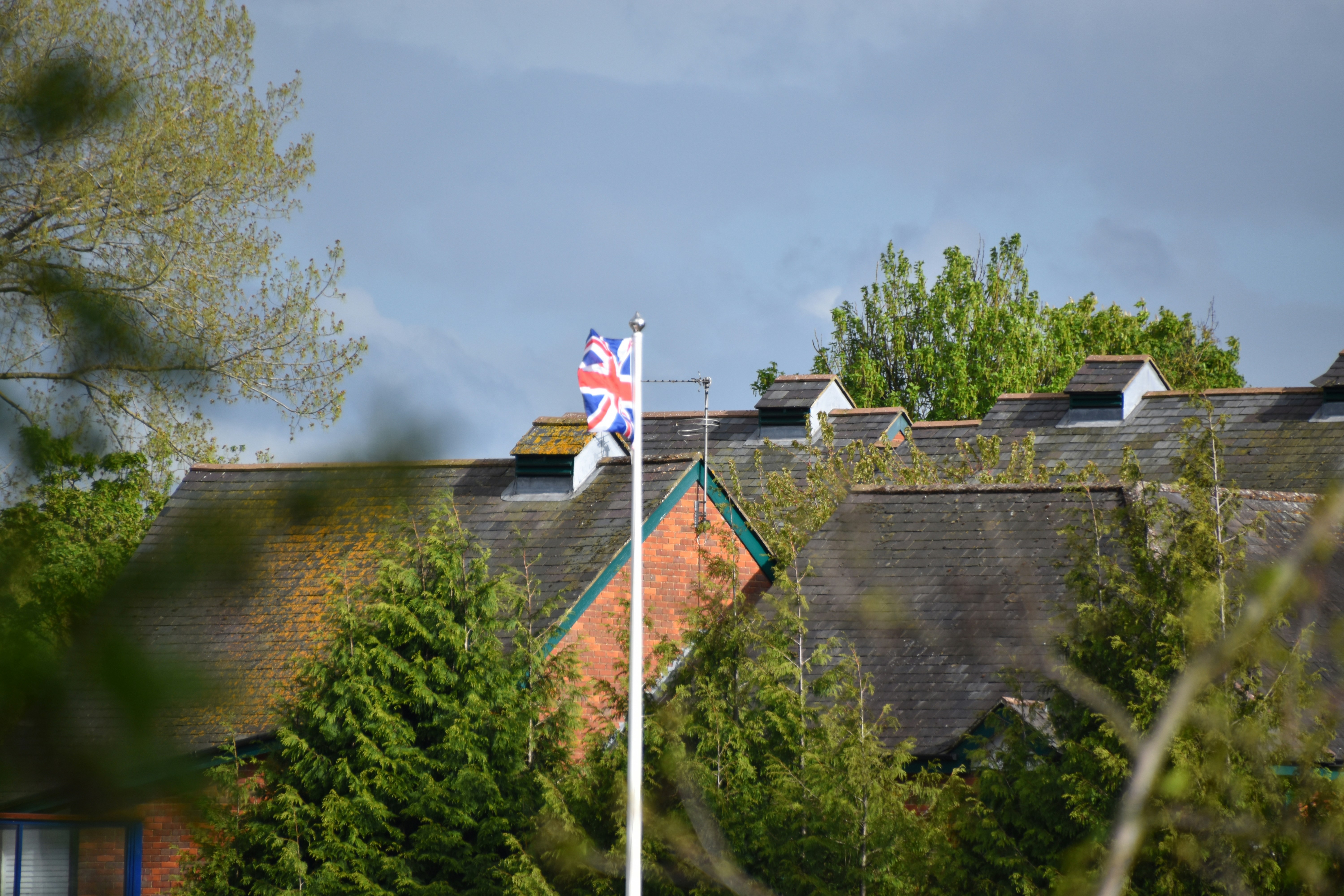 The United Kingdom, Union Jack, flag flying in the wind.