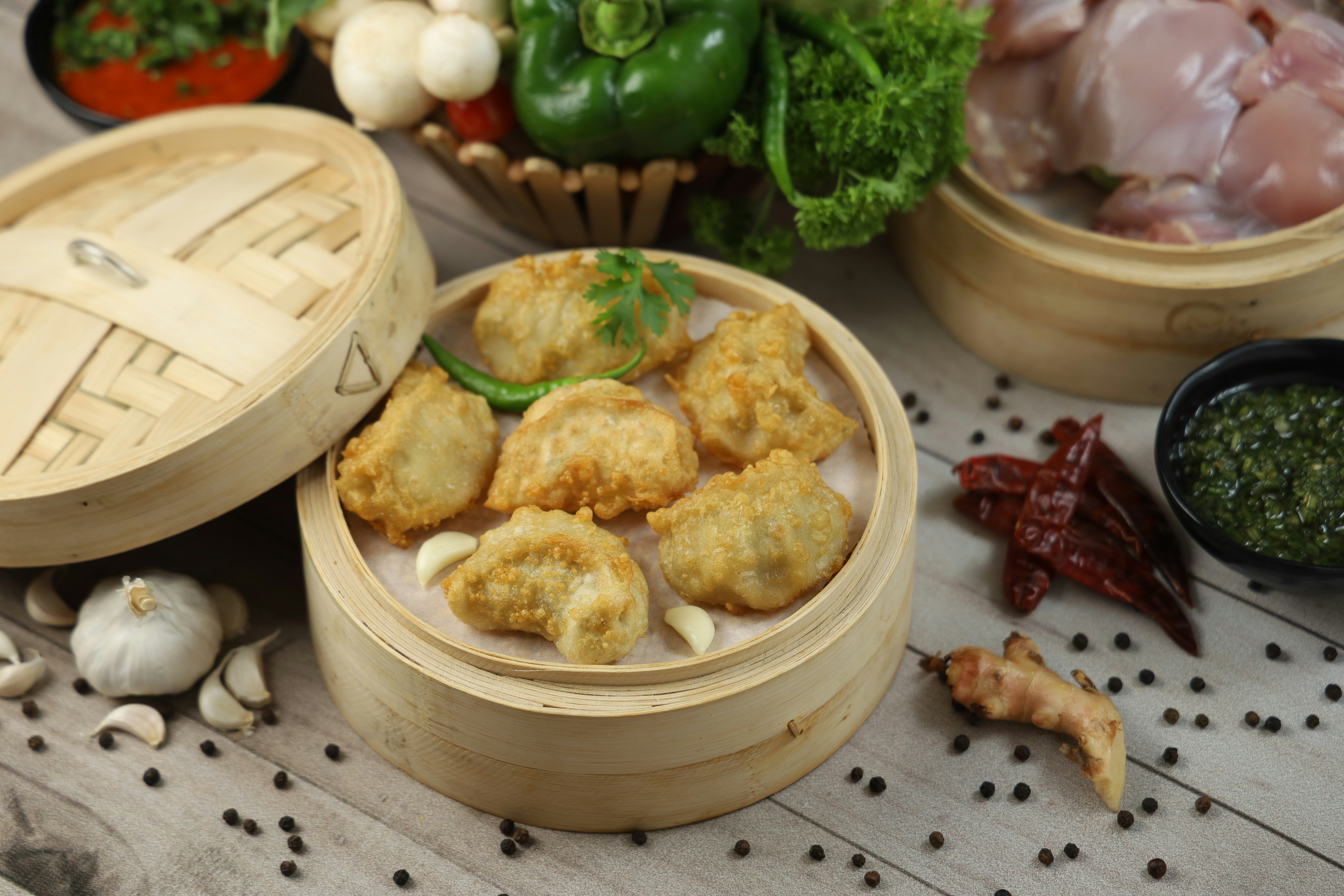 Golden Dim Sum Carousel: Fried Dumplings Resting in a Bamboo Steamer