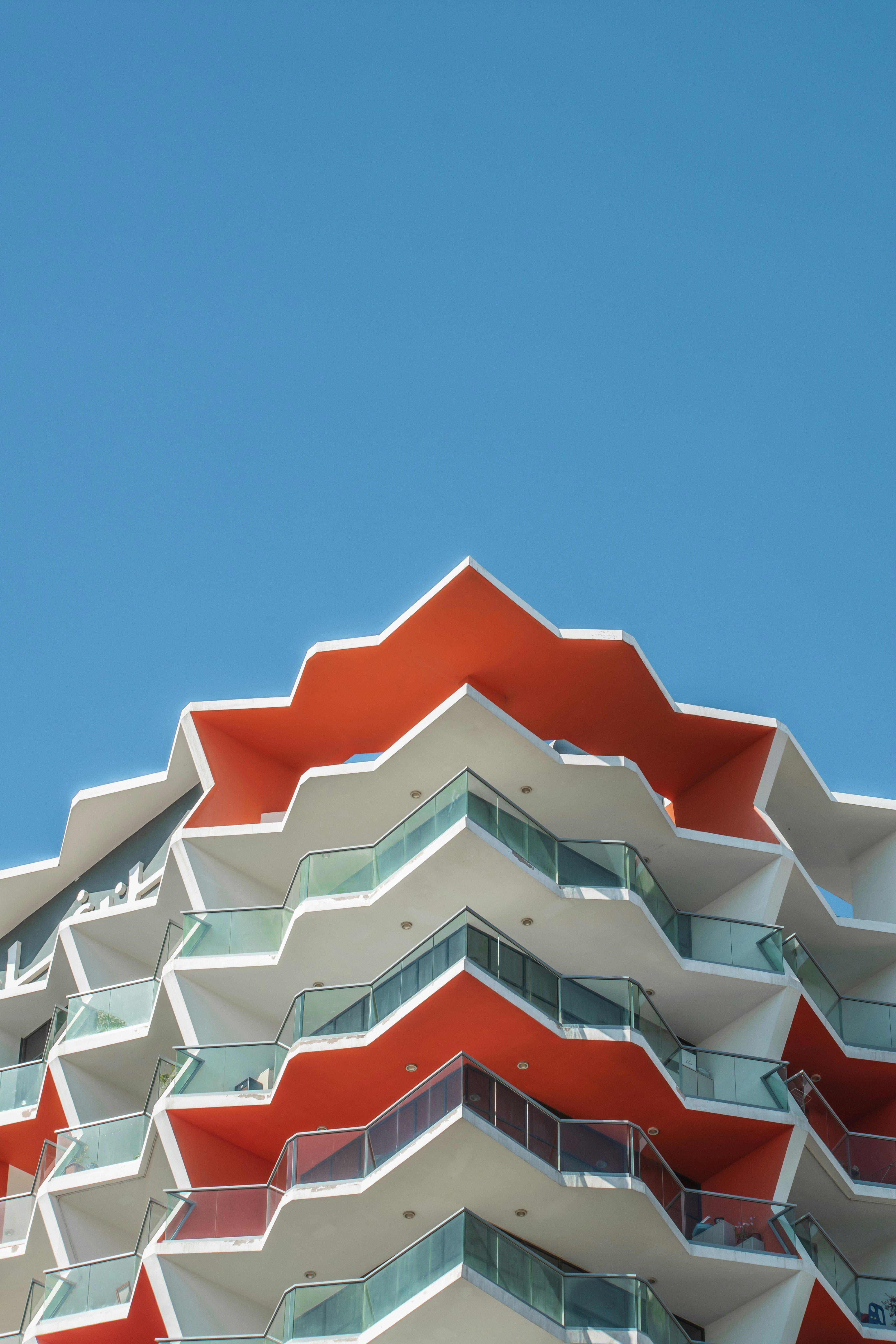 A tall building with balconies and balconies on top photo – Free Dubai ...