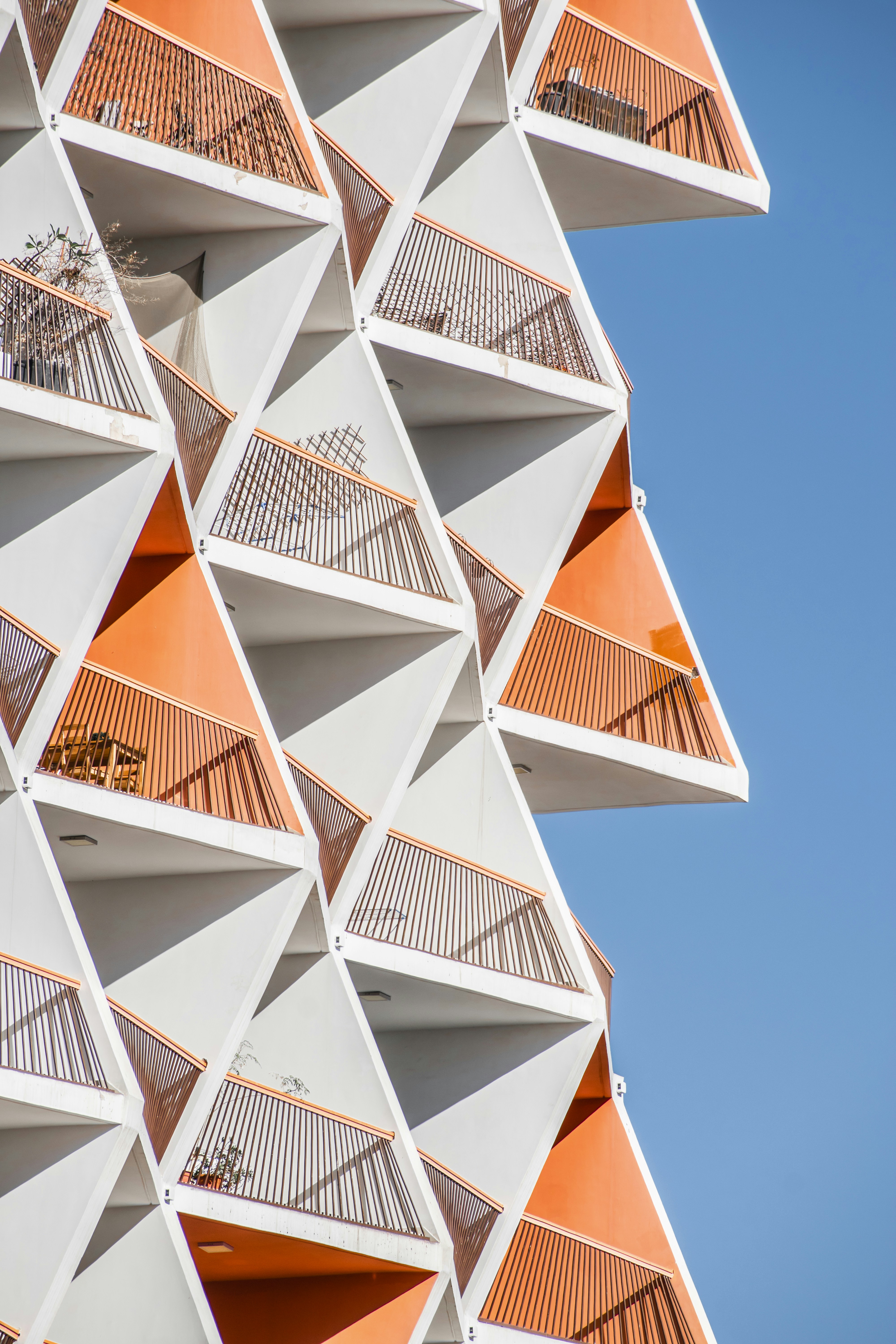 A very tall building with many balconies on it photo – Free Dubai ...