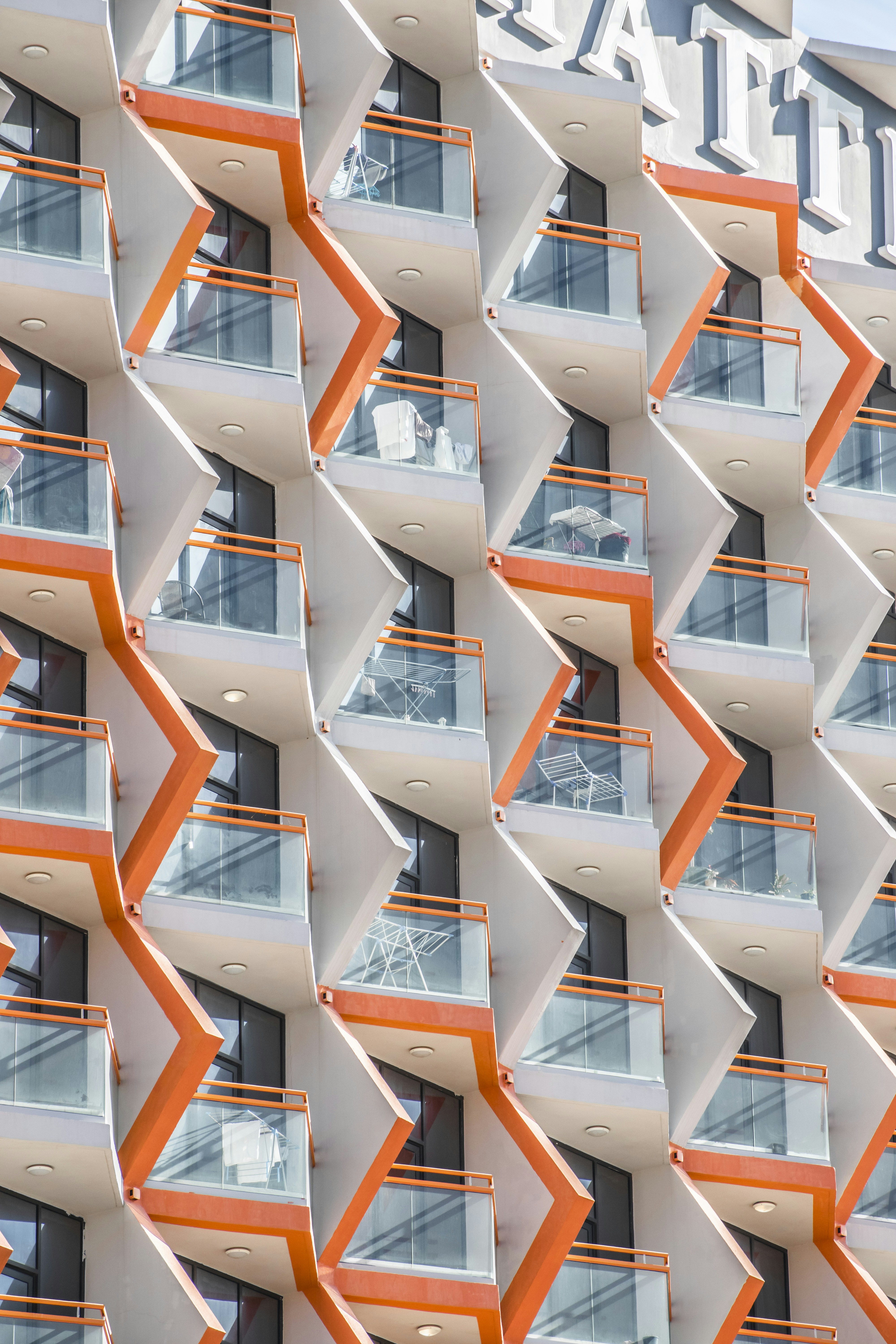 A very tall building with many balconies on it photo – Free Dubai ...