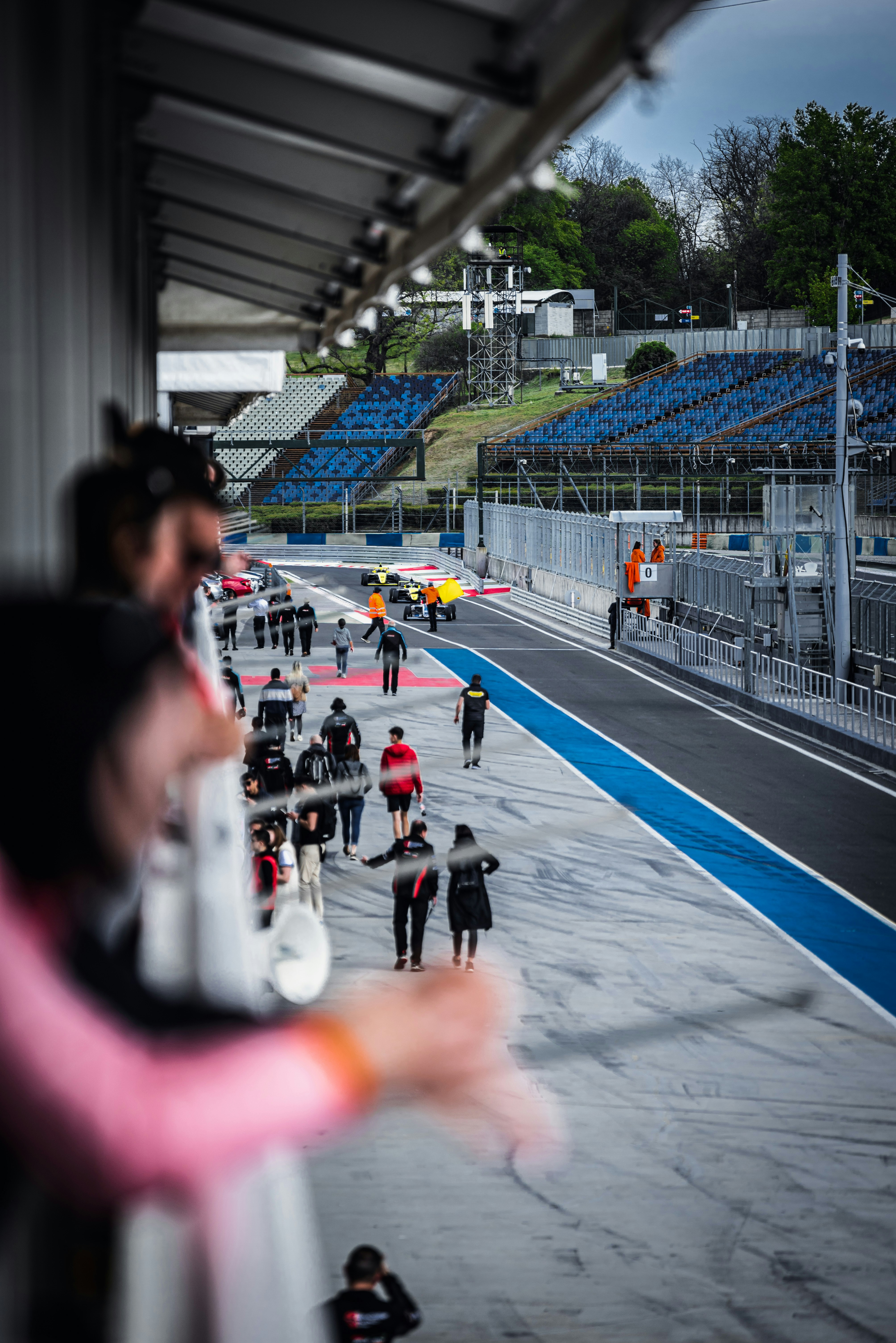 A group of people walking down a race track photo – Free Mogyoród Image ...
