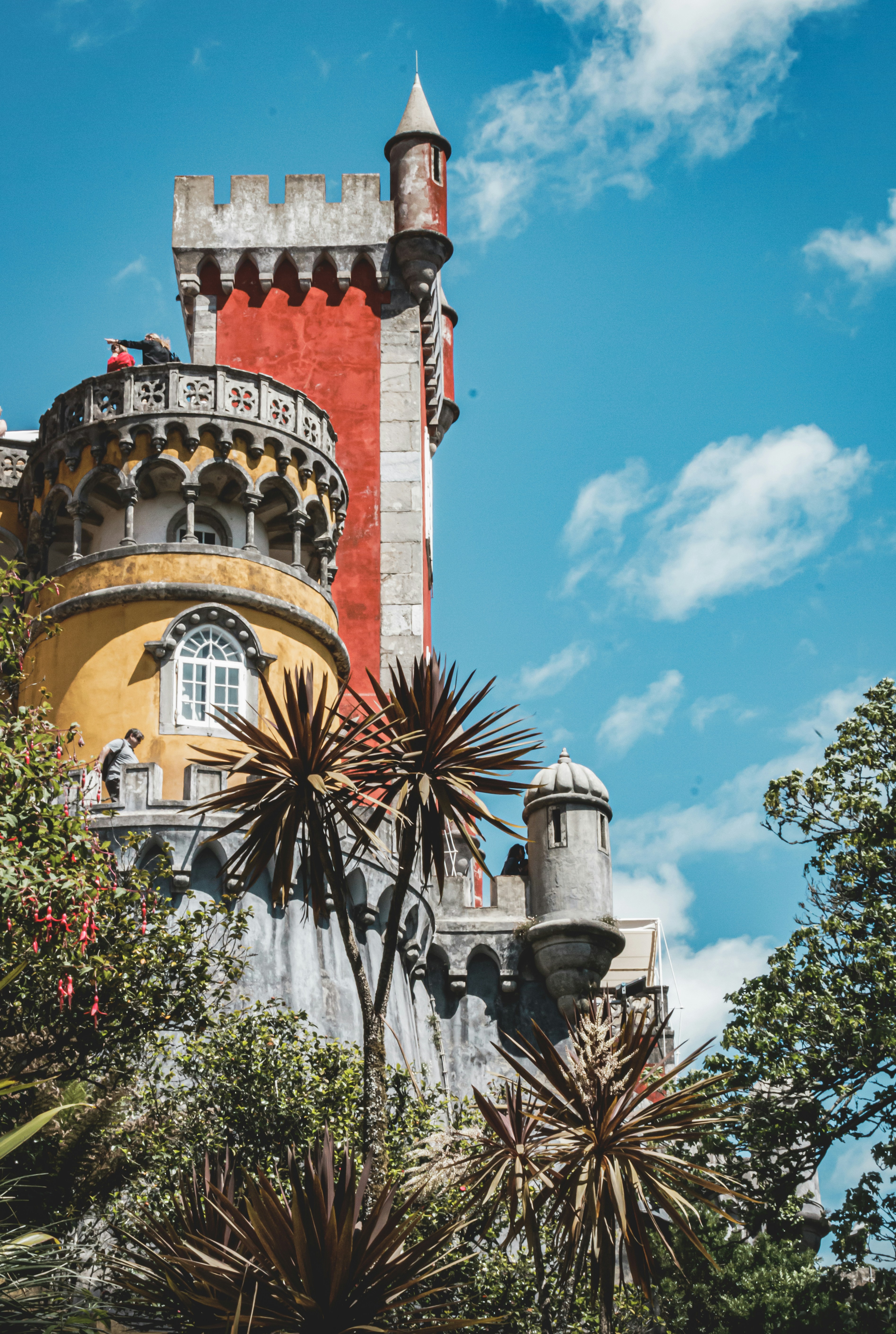 a tall tower with a clock on the top of it