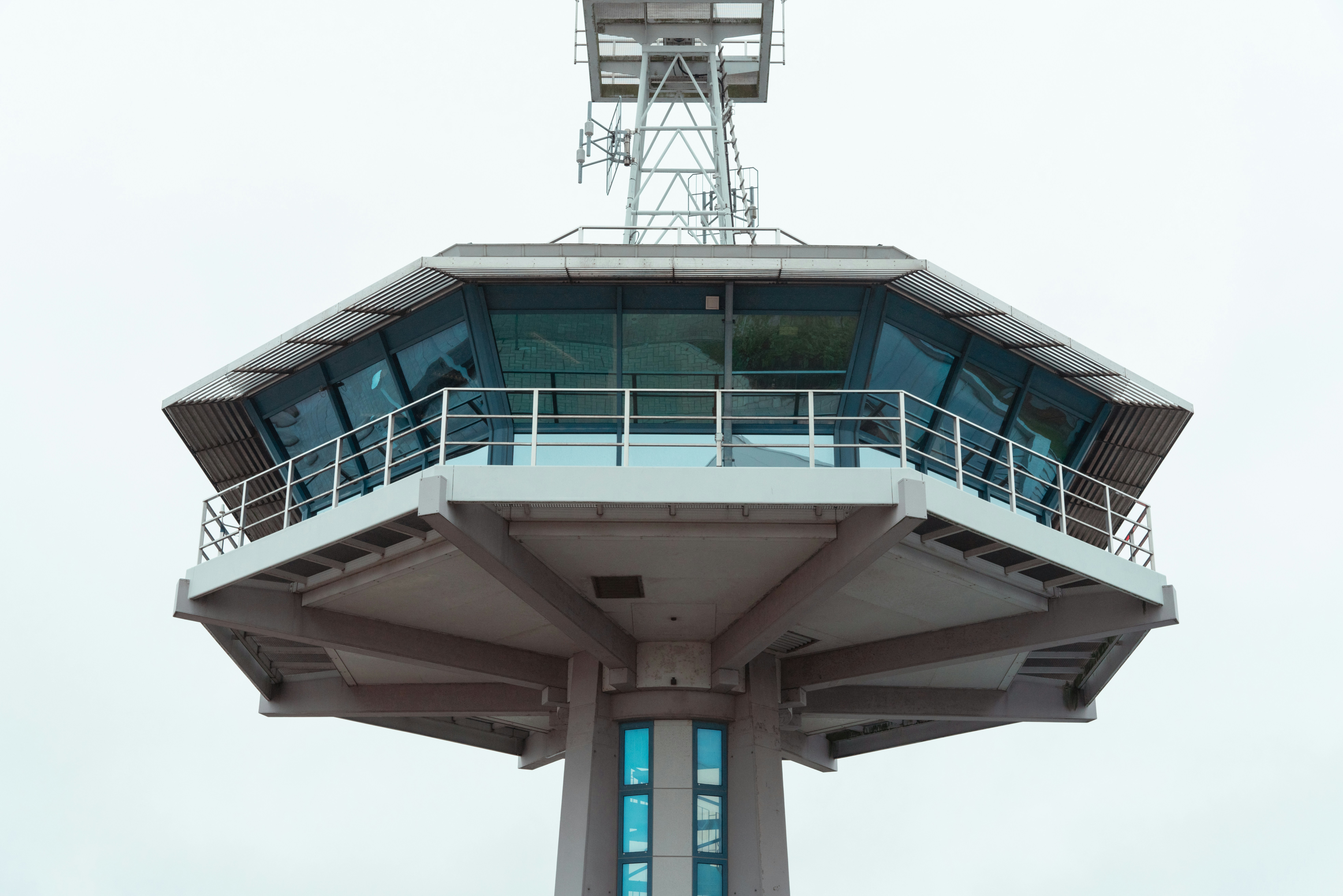 "Lotsenstation" tower in travemünde germany | a tall tower with a clock on the top of it