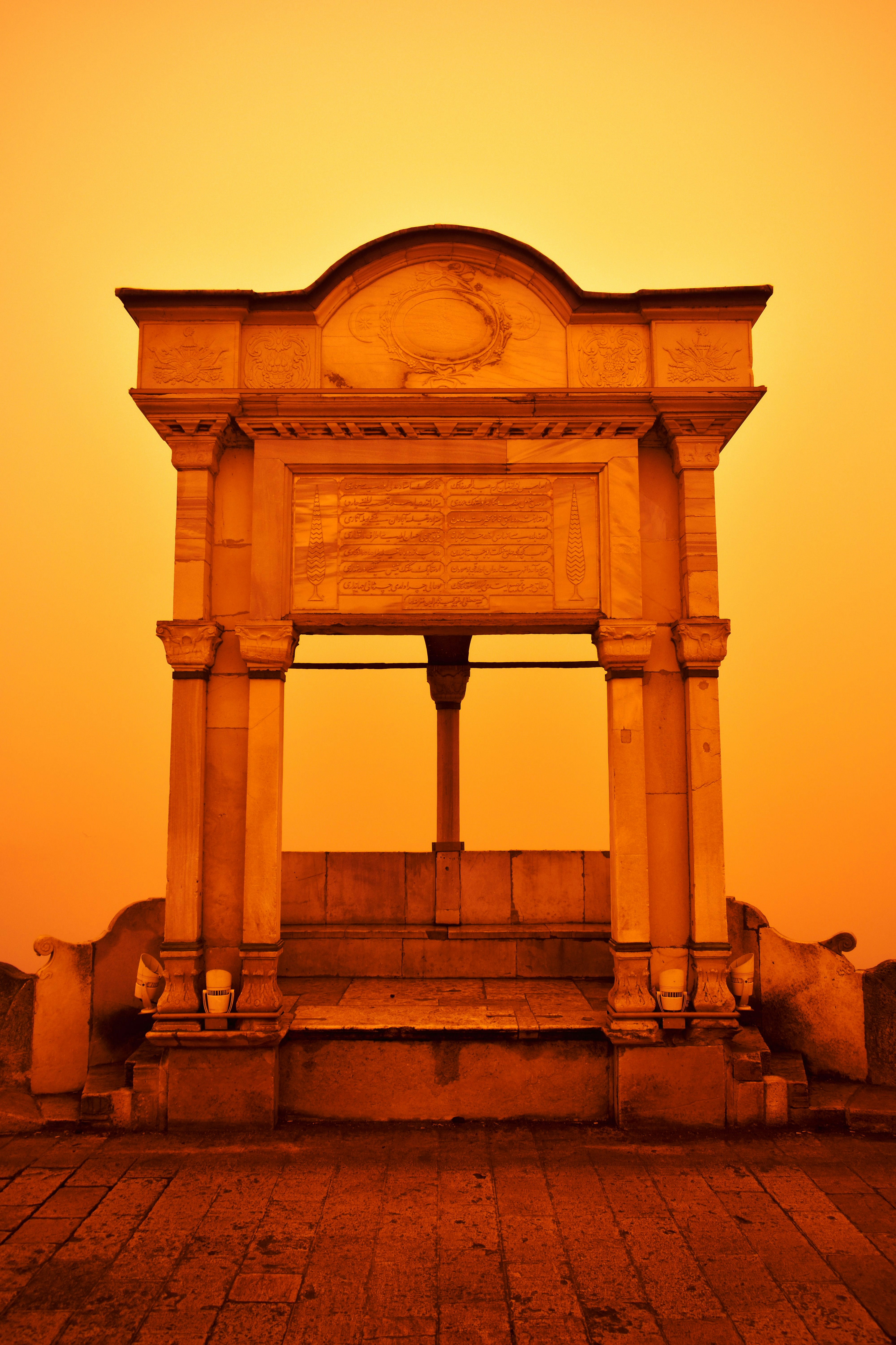 Crimson Archway Framed by a Firelit Sky