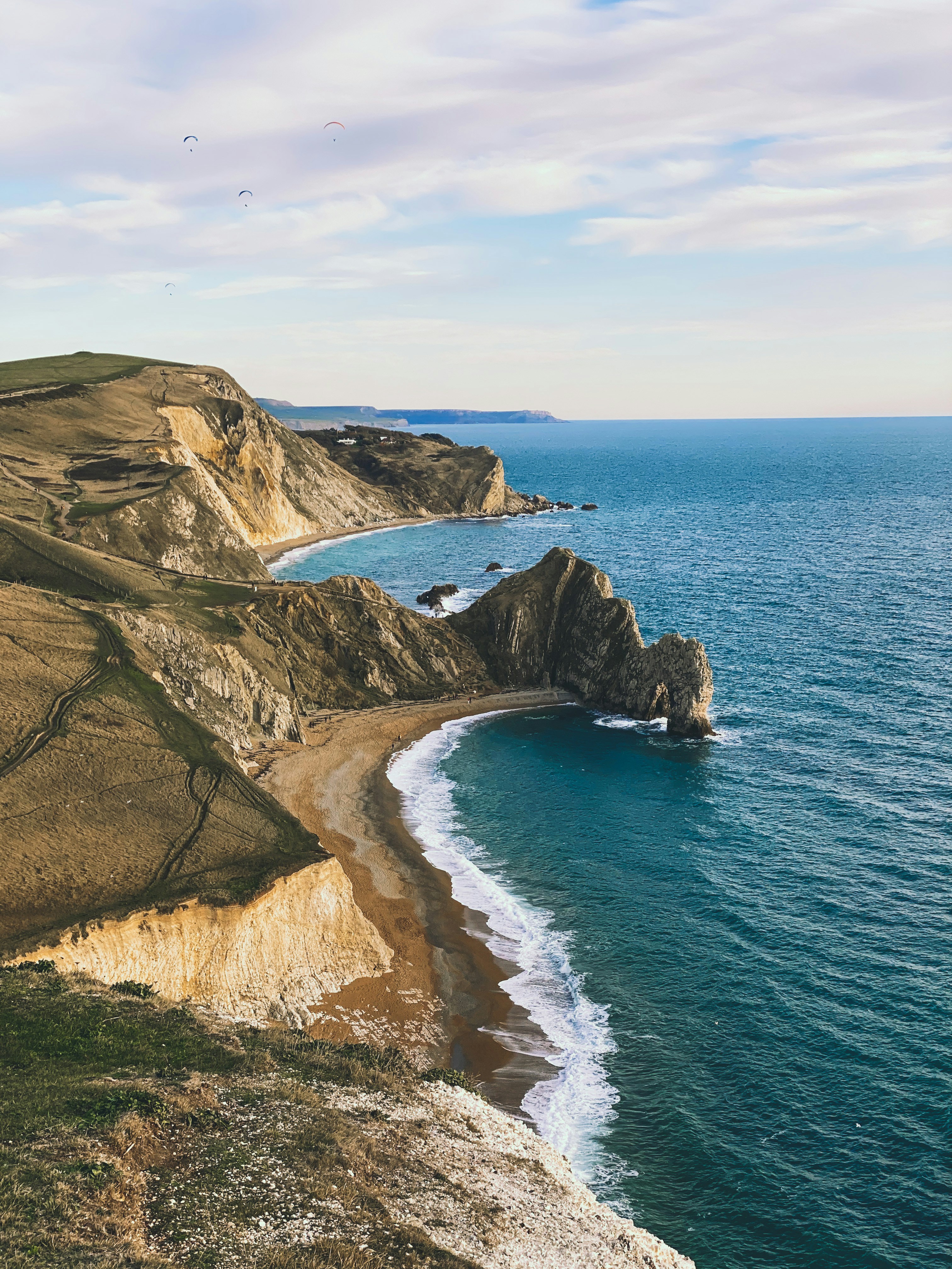 Mobile photography of Durdle Door panorama, Dorset, Jurassic Coast, England, UK. View British seaside - summer holiday destination.